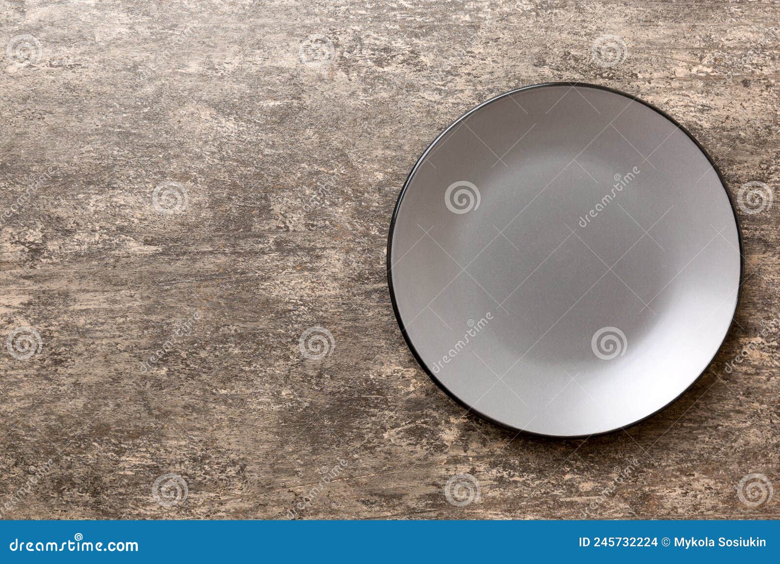 Top View of Black Plate on Cement Background. Empty Space for Your ...