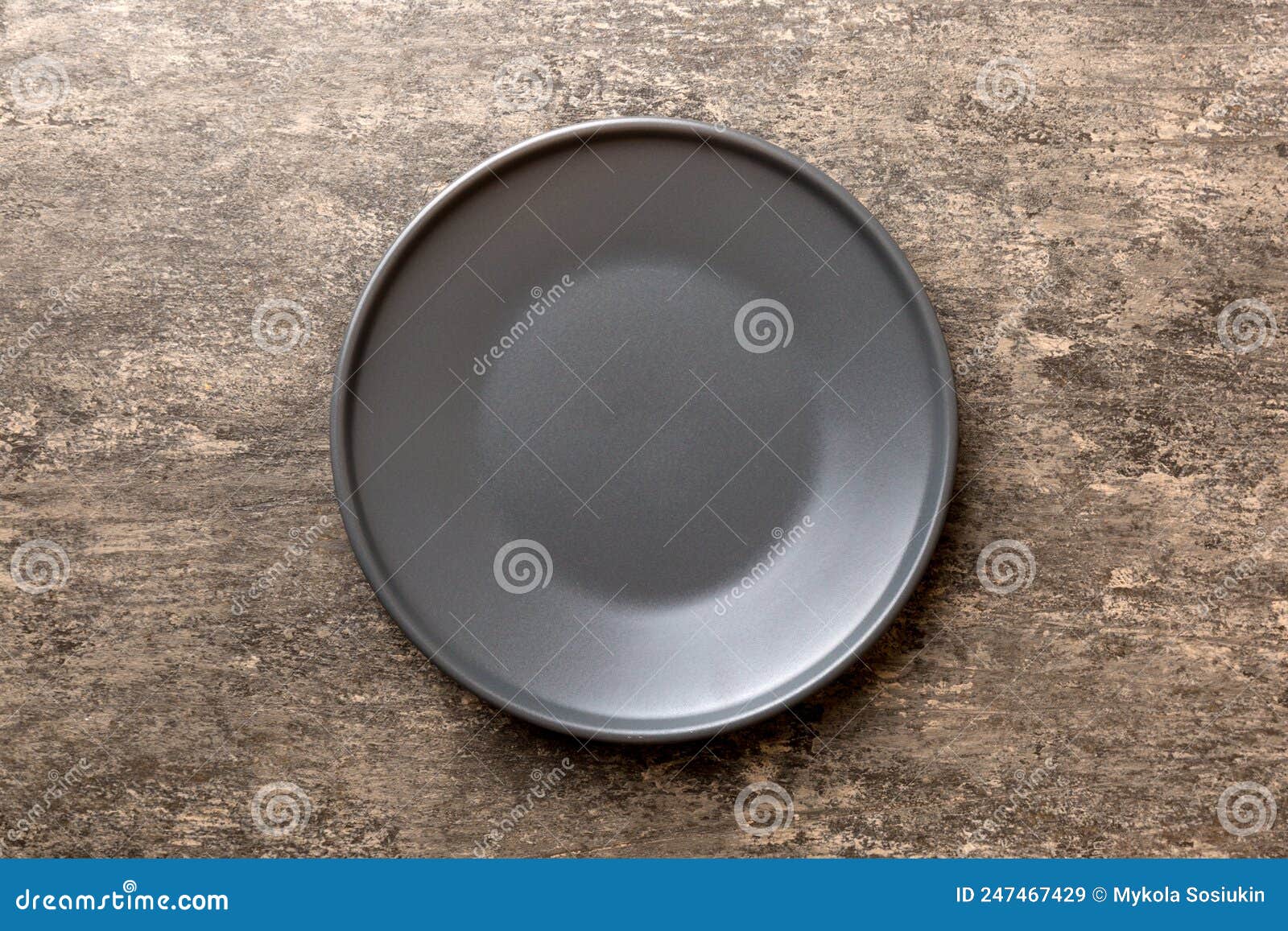 Top View of Black Plate on Cement Background. Empty Space for Your ...