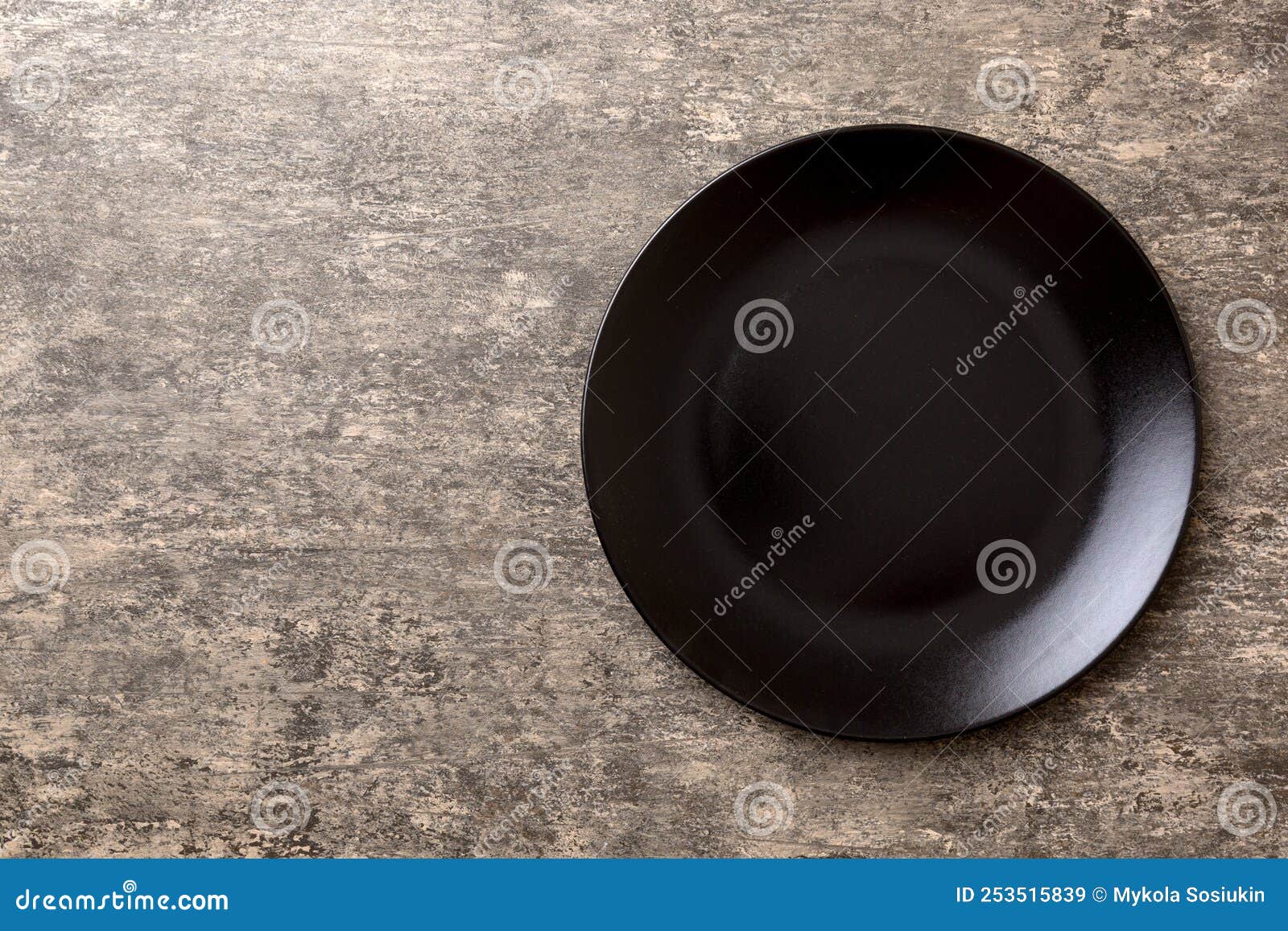 Top View of Black Plate on Cement Background. Empty Space for Your ...
