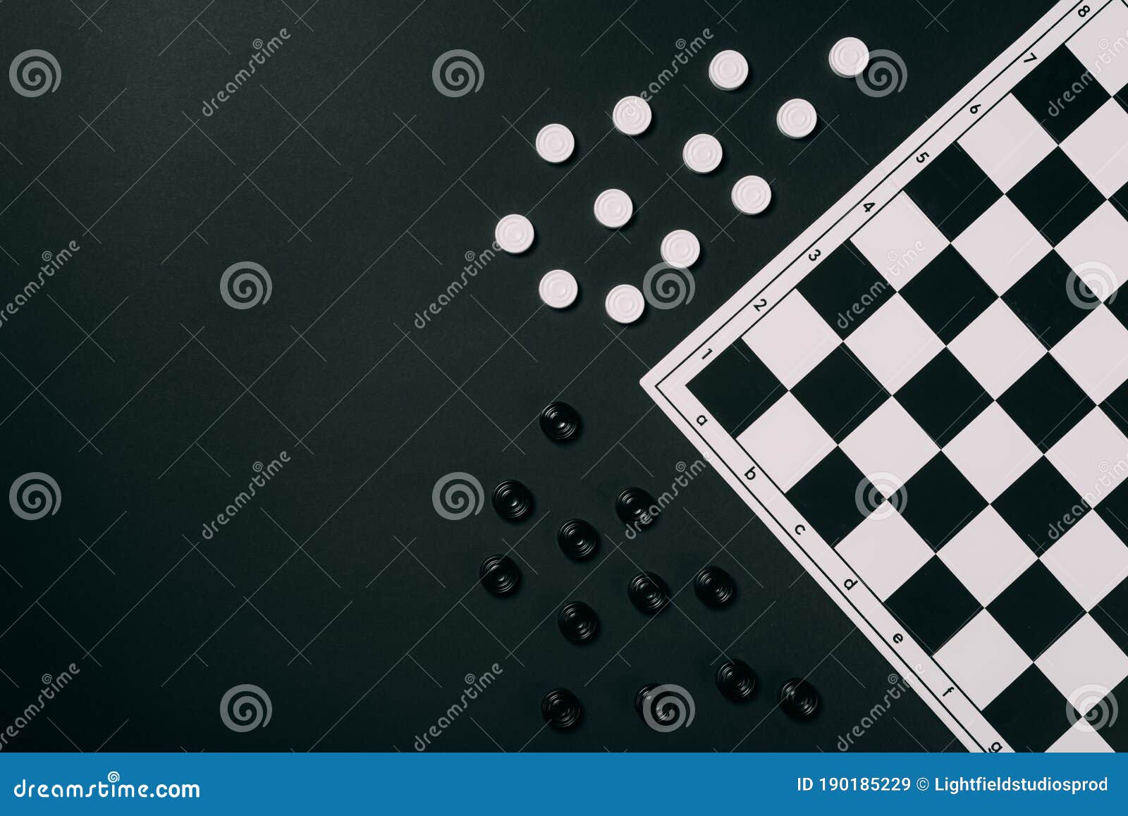 Top View of Black and White Checkers and Checkerboard Stock Image ...