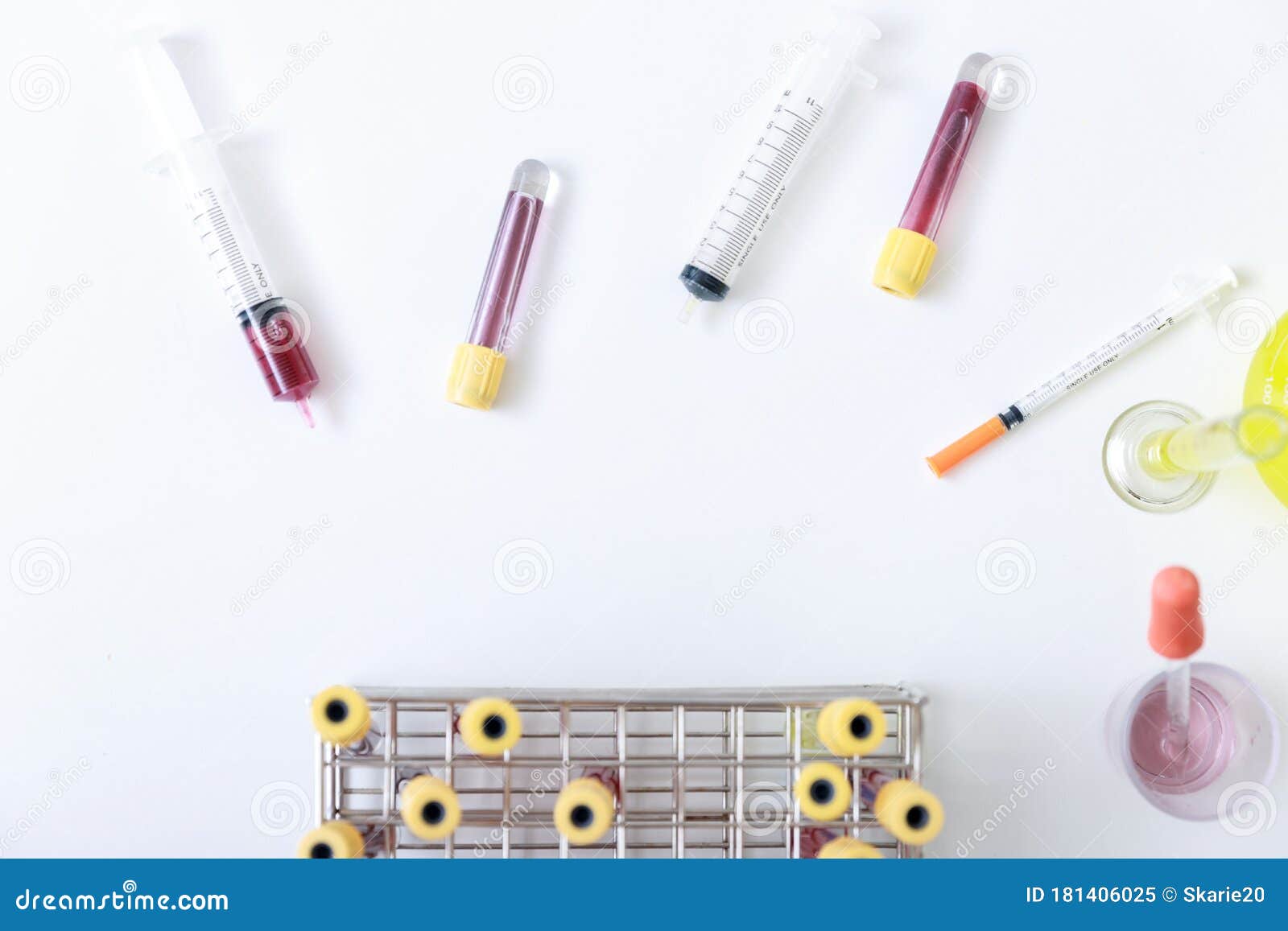 Top View of Blood Samples in Tubes and Syringes on Work Table in a ...