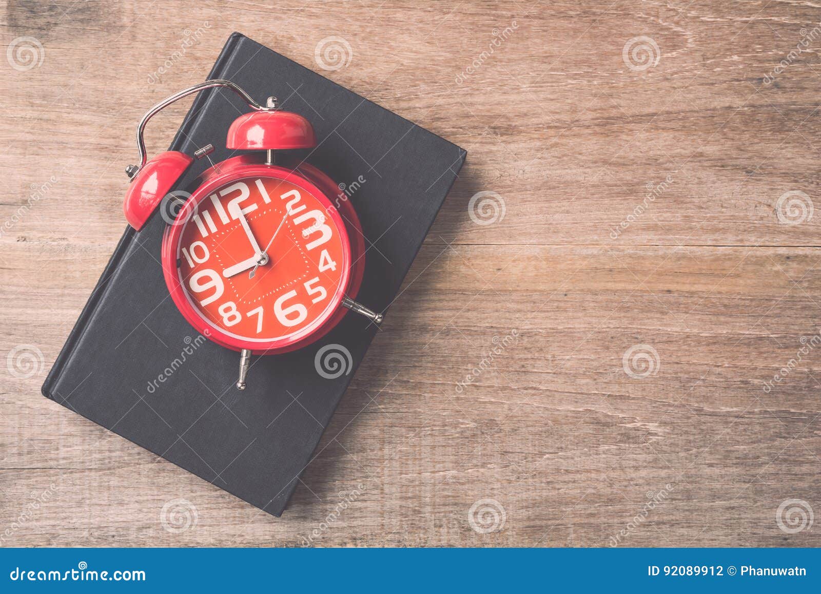 Top View Book and Red Clock on Wooden Plank Background Stock Photo ...