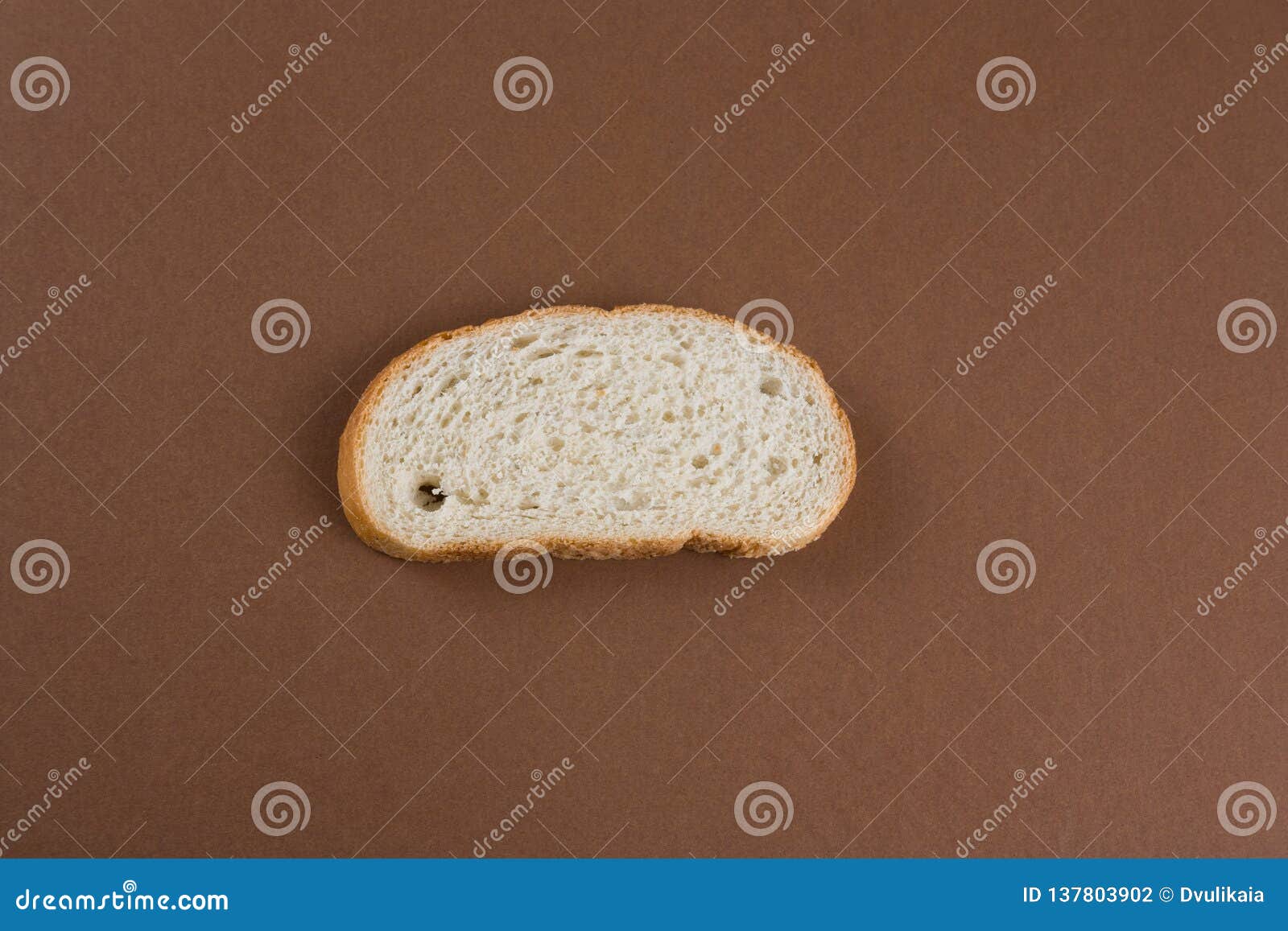Bread Slice on a Brown Background Stock Photo - Image of bakery, bread ...