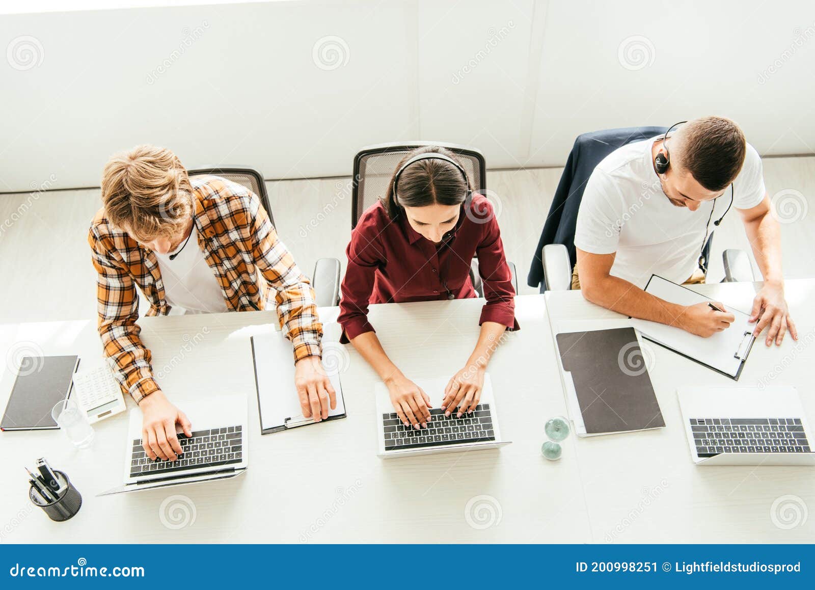 Top View of Brokers in Headsets Stock Image - Image of laptops ...