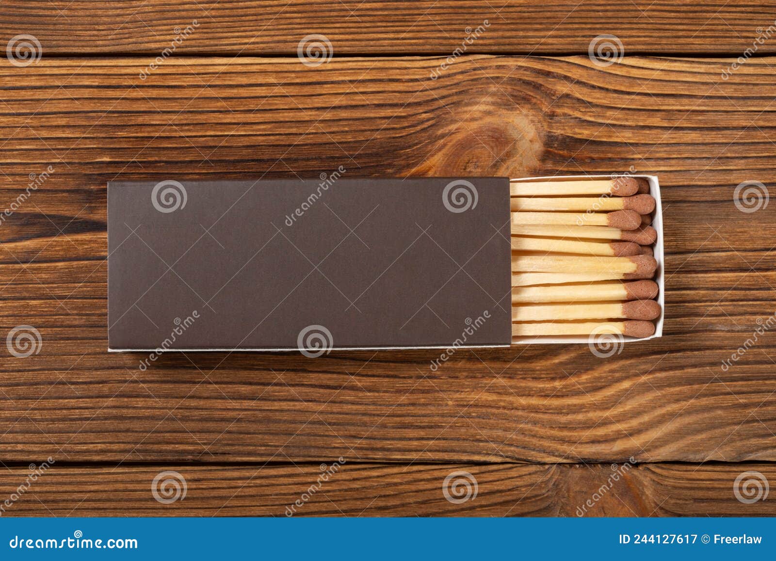 Brown Color Matchbox with Brown Match Sticks on a Wood Table Stock ...