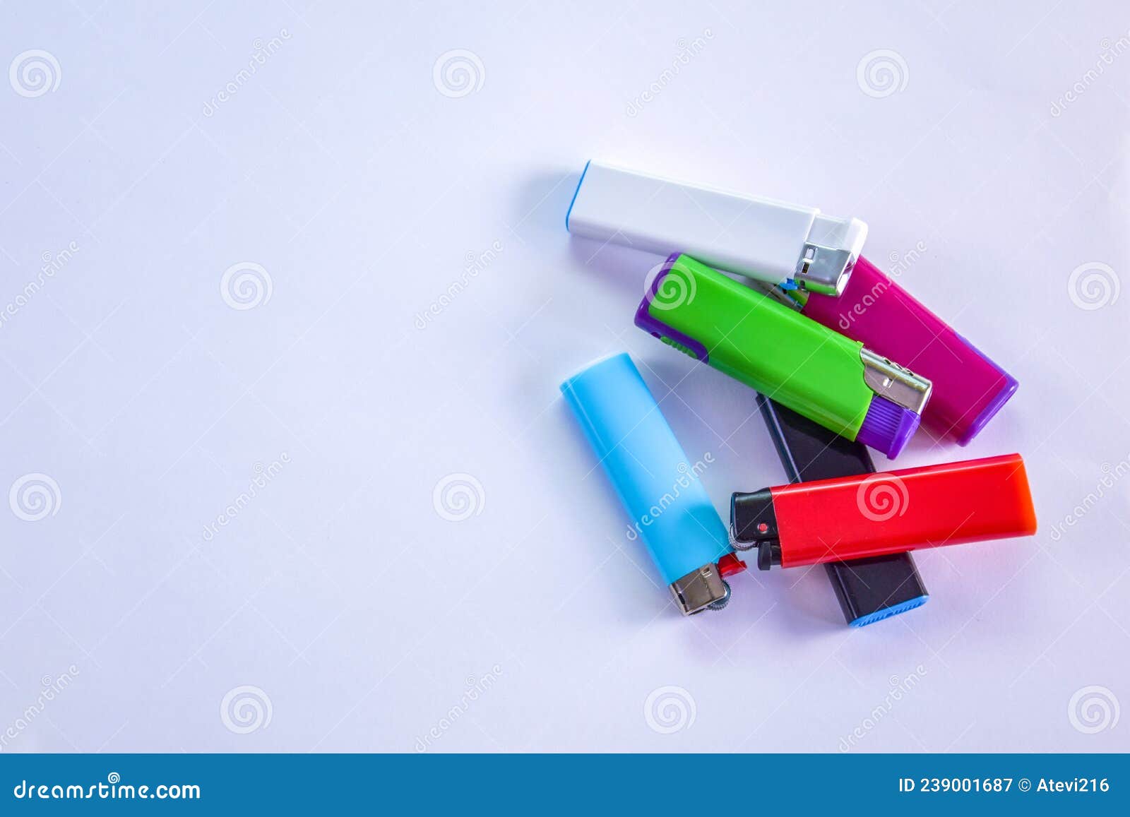 Top View of a Bunch of Different Colors and Designs of Lighters. Gas ...
