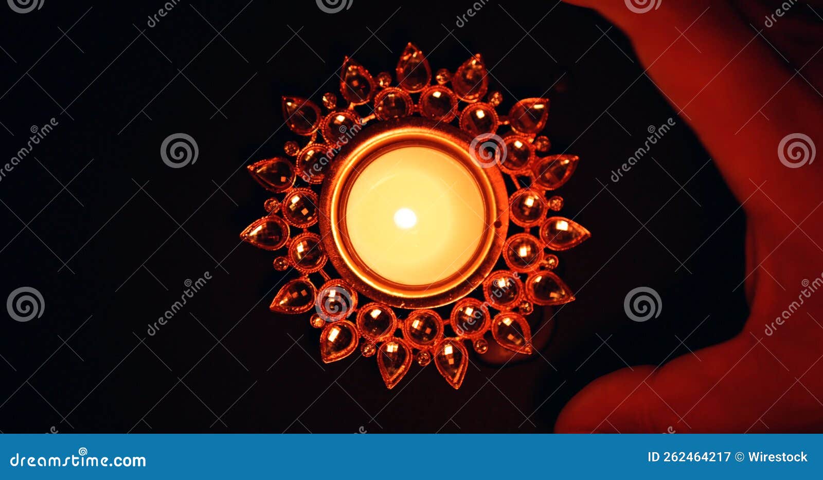 Top View of a Burning Candle in a Beautiful Sun-shaped Candlestick Base ...