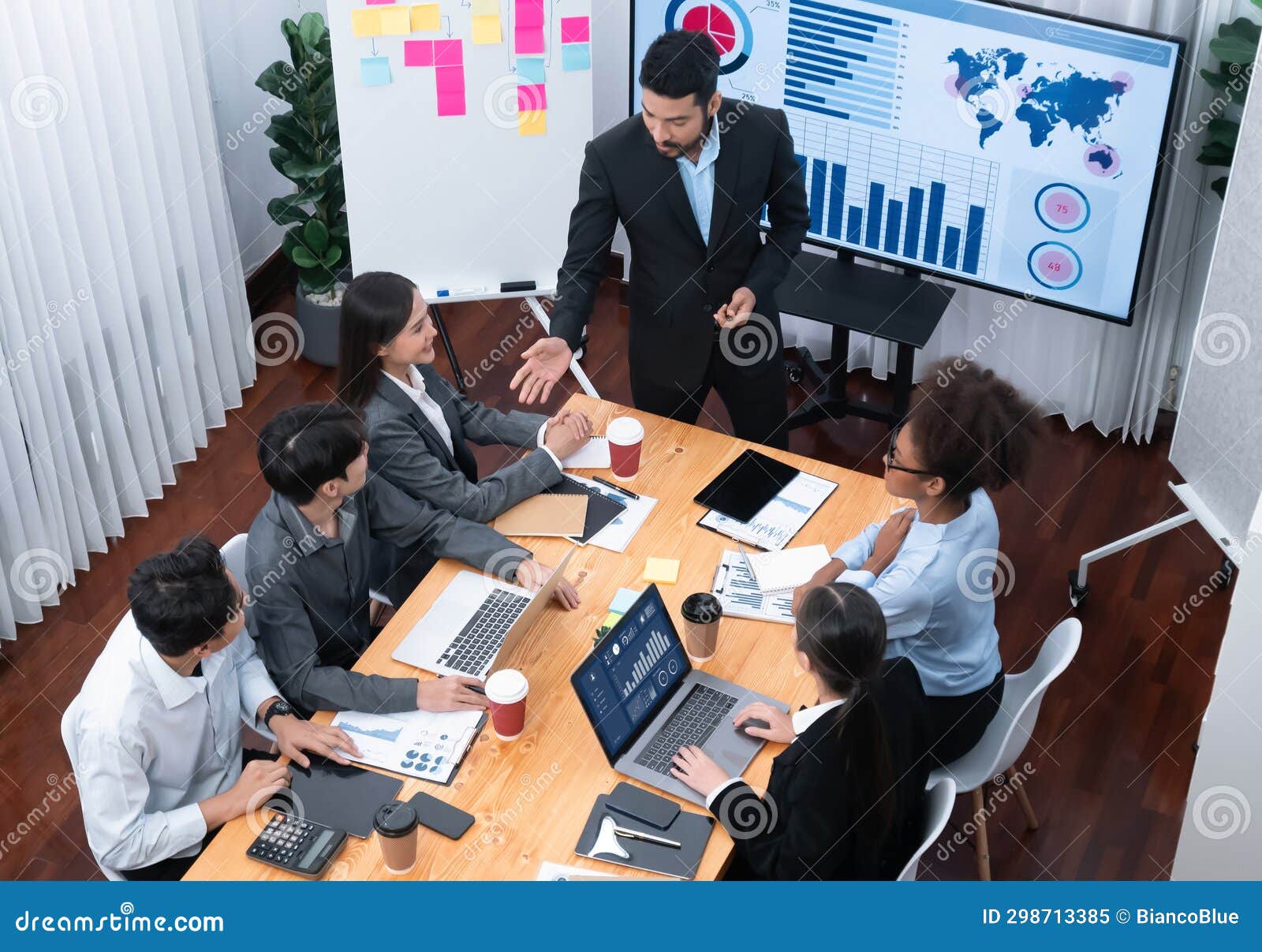 Top View Business Presentation with Data Analysis Dashboard on TV ...