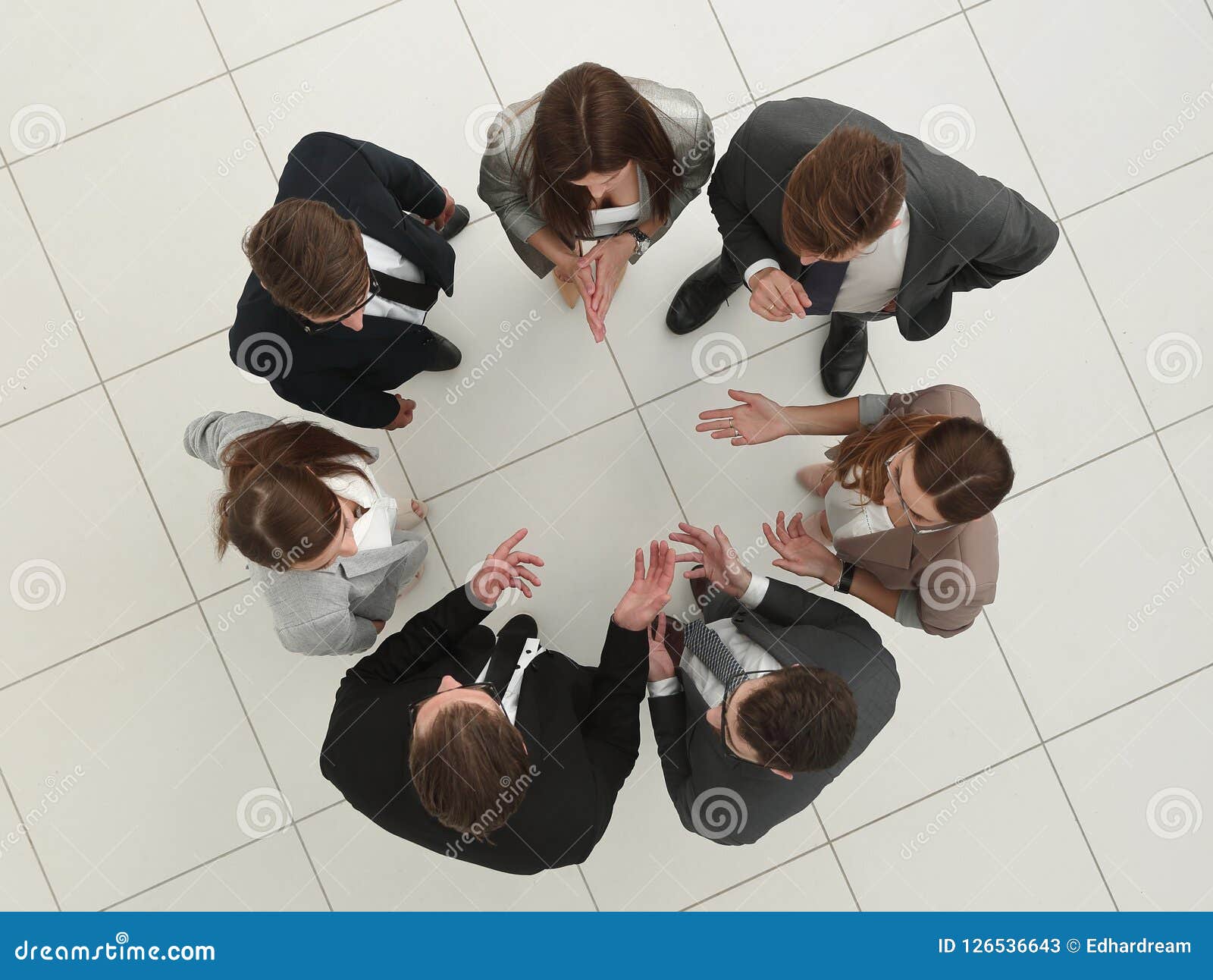 Top View.business Team Discussing Something Standing in a Circle Stock ... Top View.business Team Discussing Something Standing in a Circle Stock ...