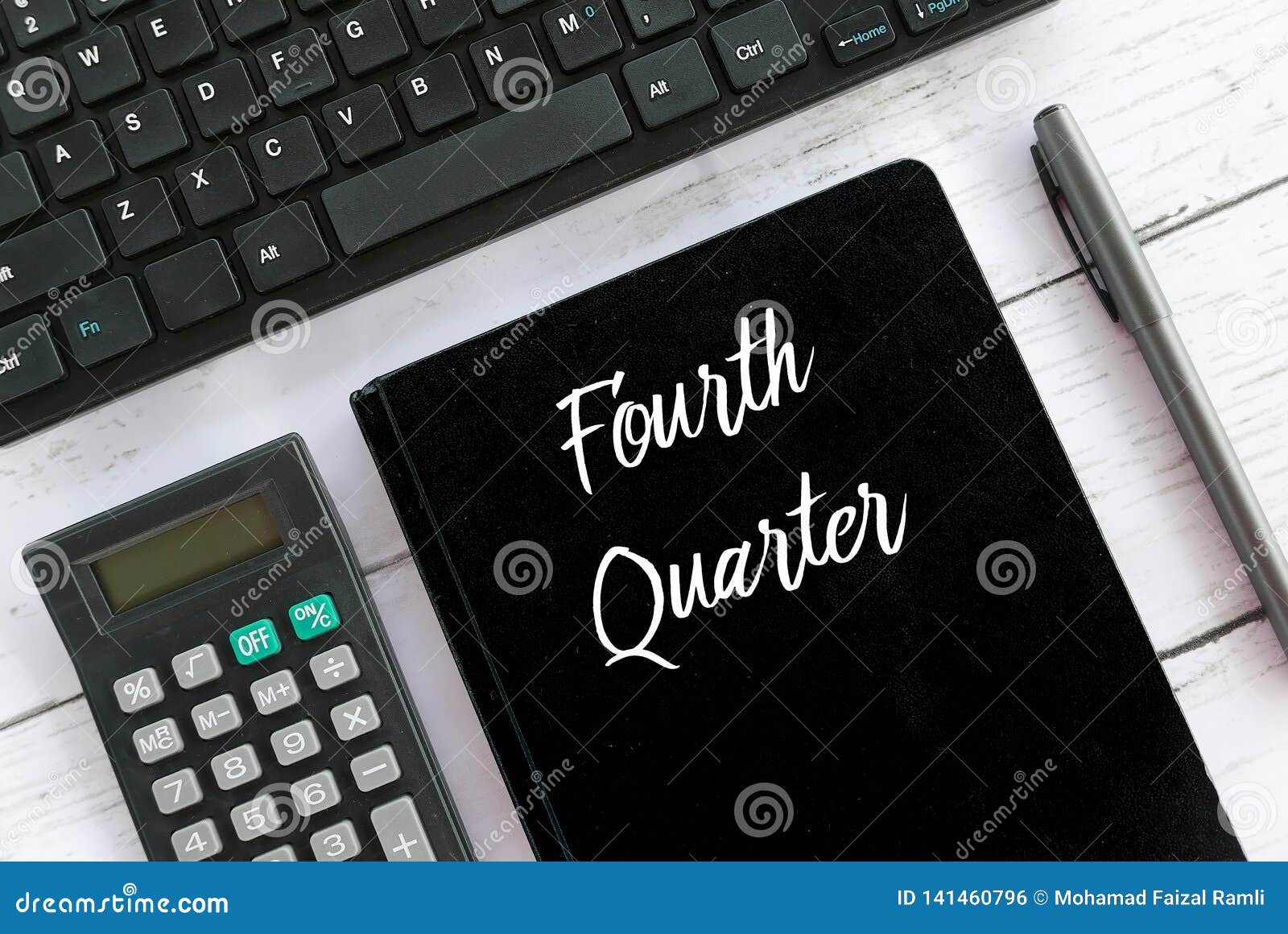 Top View of Calculator,keyboard,pen and Notebook Written with Fourth ...