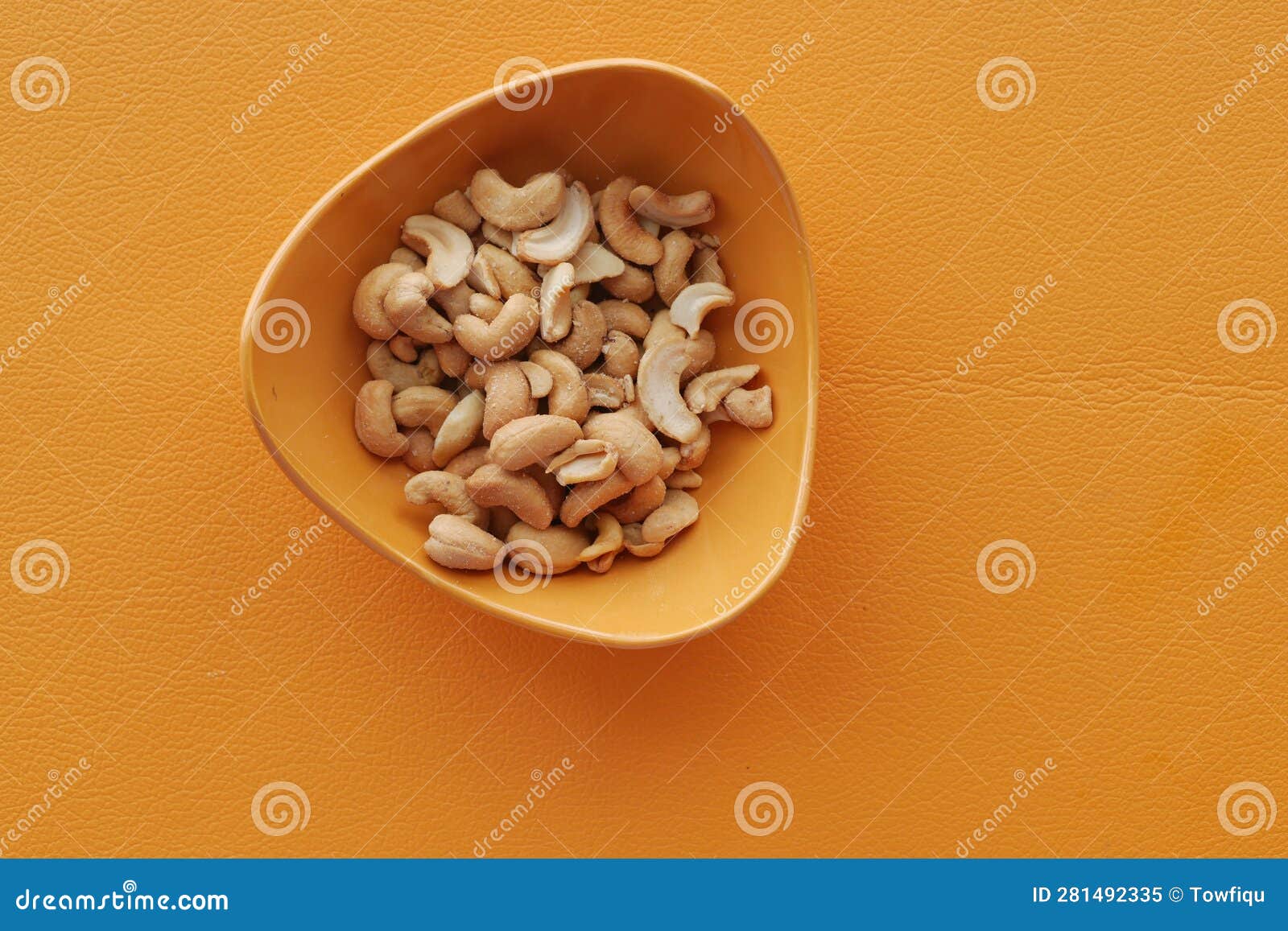 Top View of Cashew Nuts in a Orange Color Bowl Stock Image - Image of ...