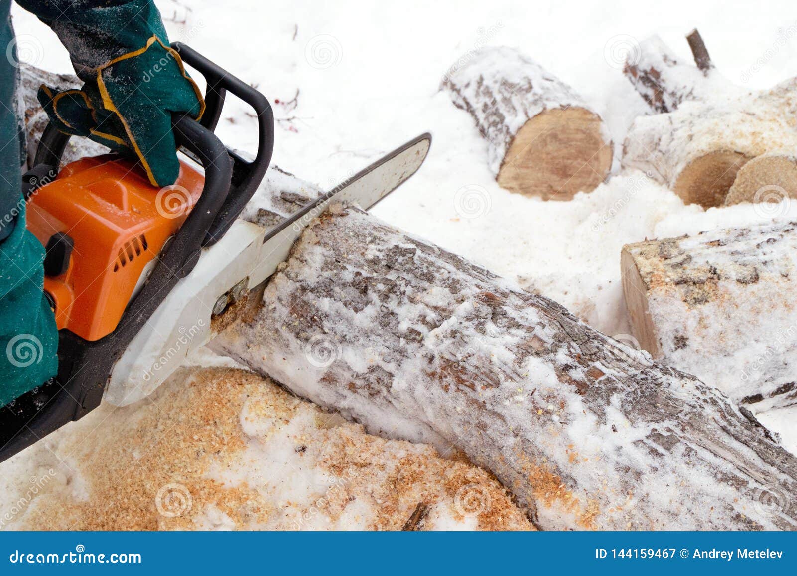 Top View of the Chainsaw that Saws a Log on the Ground Stock Image ...