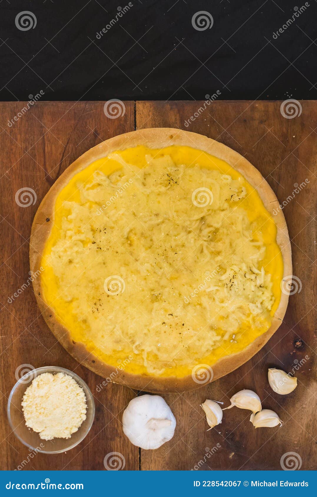 Top View of Cheesy Garlic Pizza with Separate Ingredients Stock Image ...
