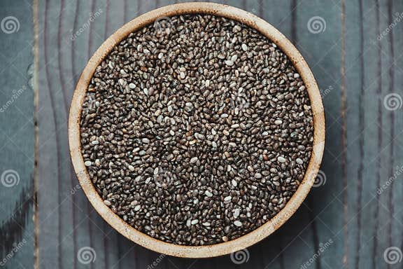Top view of the Chia seeds stock image. Image of wooden - 260979079