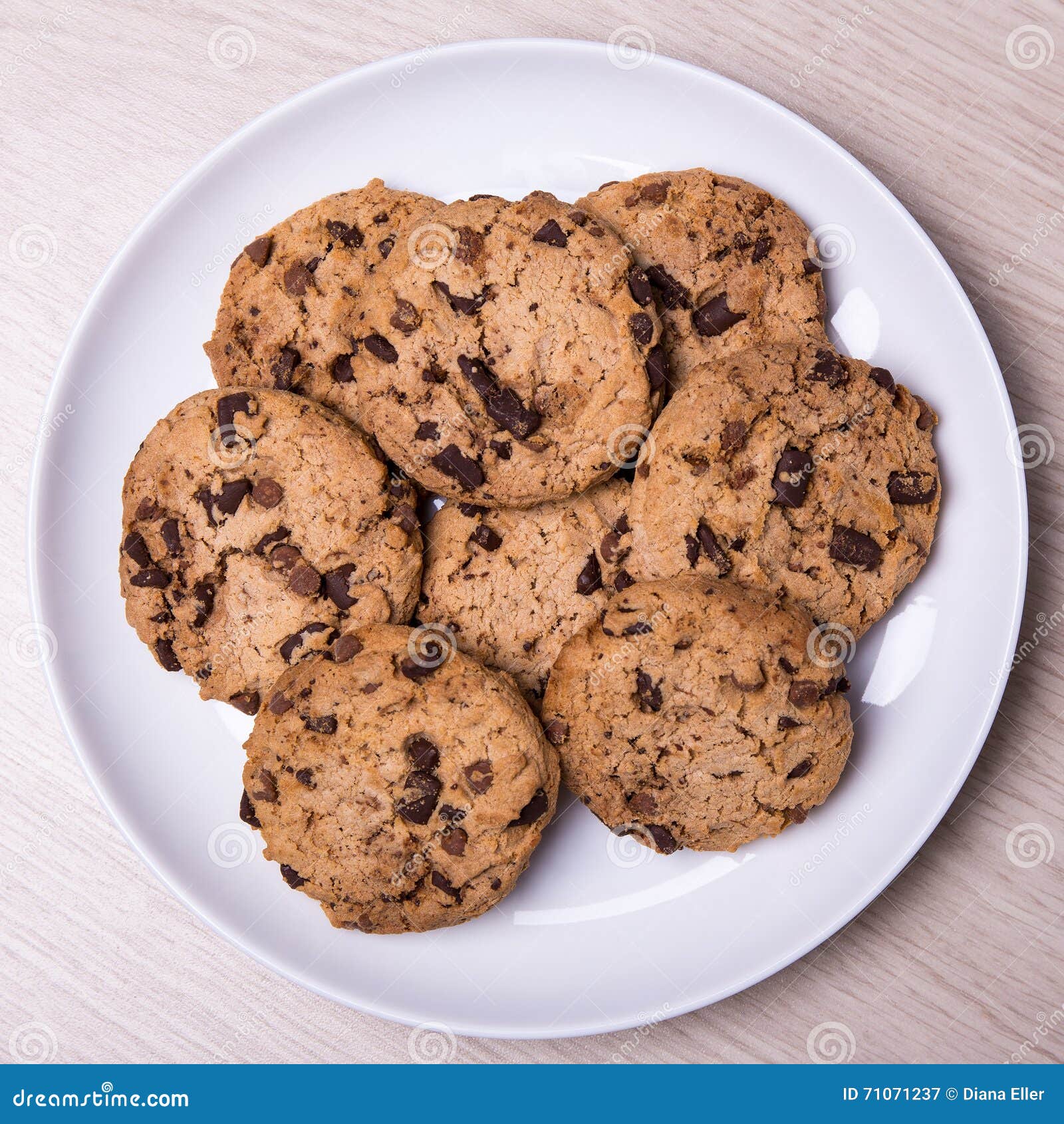 Top View of Chocolate Chip Cookies on White Plate on Wooden Table Stock ...