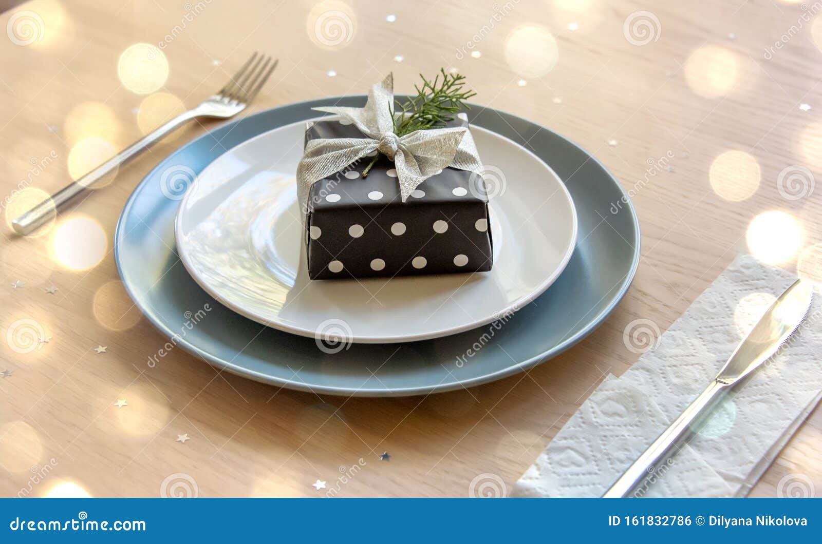 Top View of Christmas Table Setting. a Gift Box in a Plate Stock Photo ...