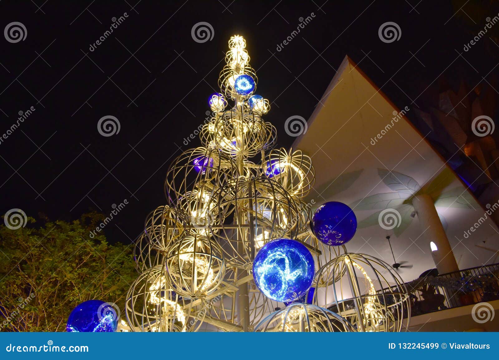 Top View of Christmas Tree and Triangular Building at Night Editorial ...