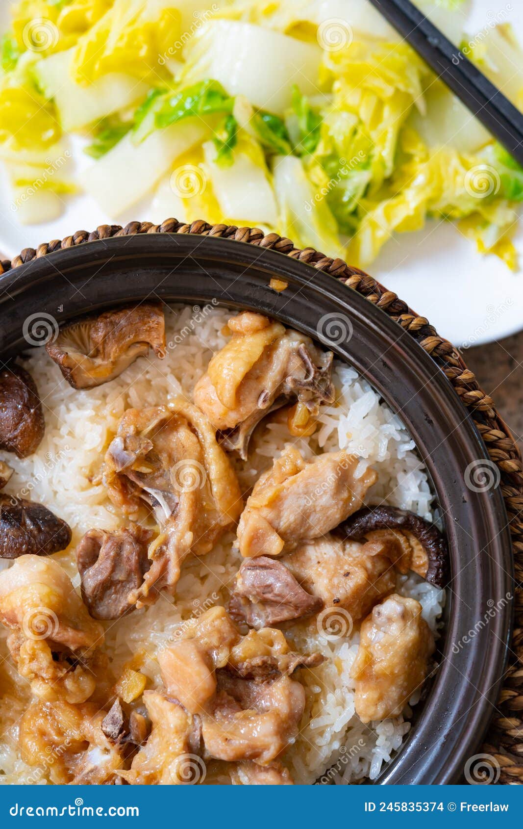 Clay Pot Rice with Chicken and Mushrooms and Cabbage at Vertical ...