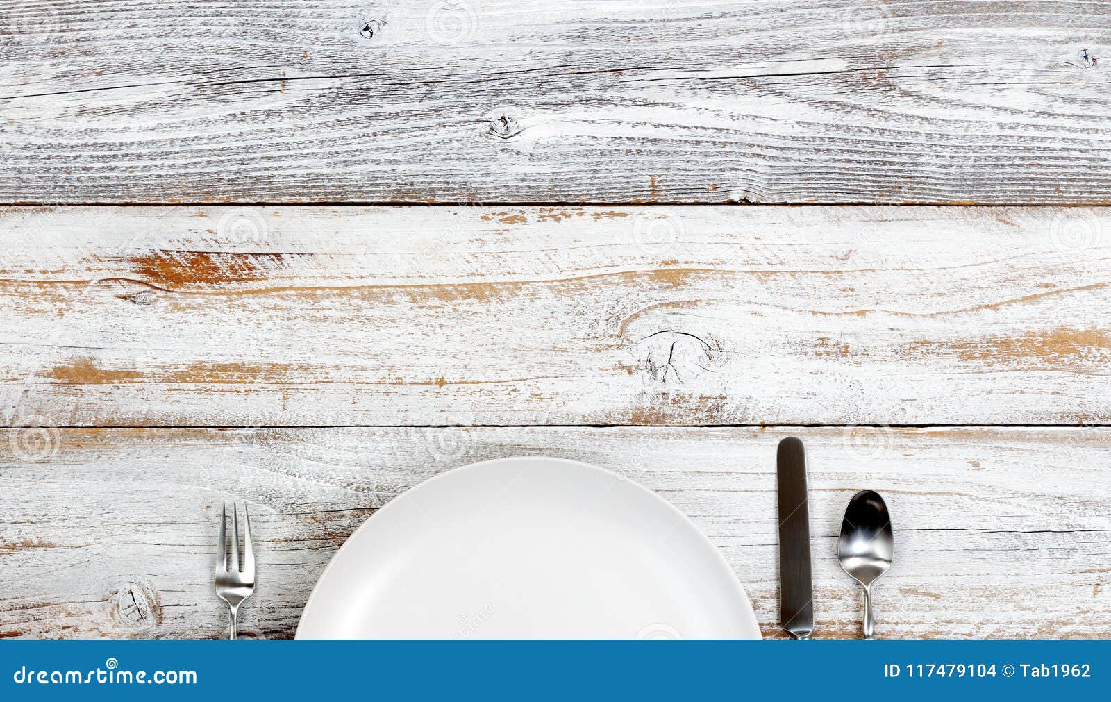 Top View of Clean Dinner Plate and Silverware on White Rustic Ta Stock ...