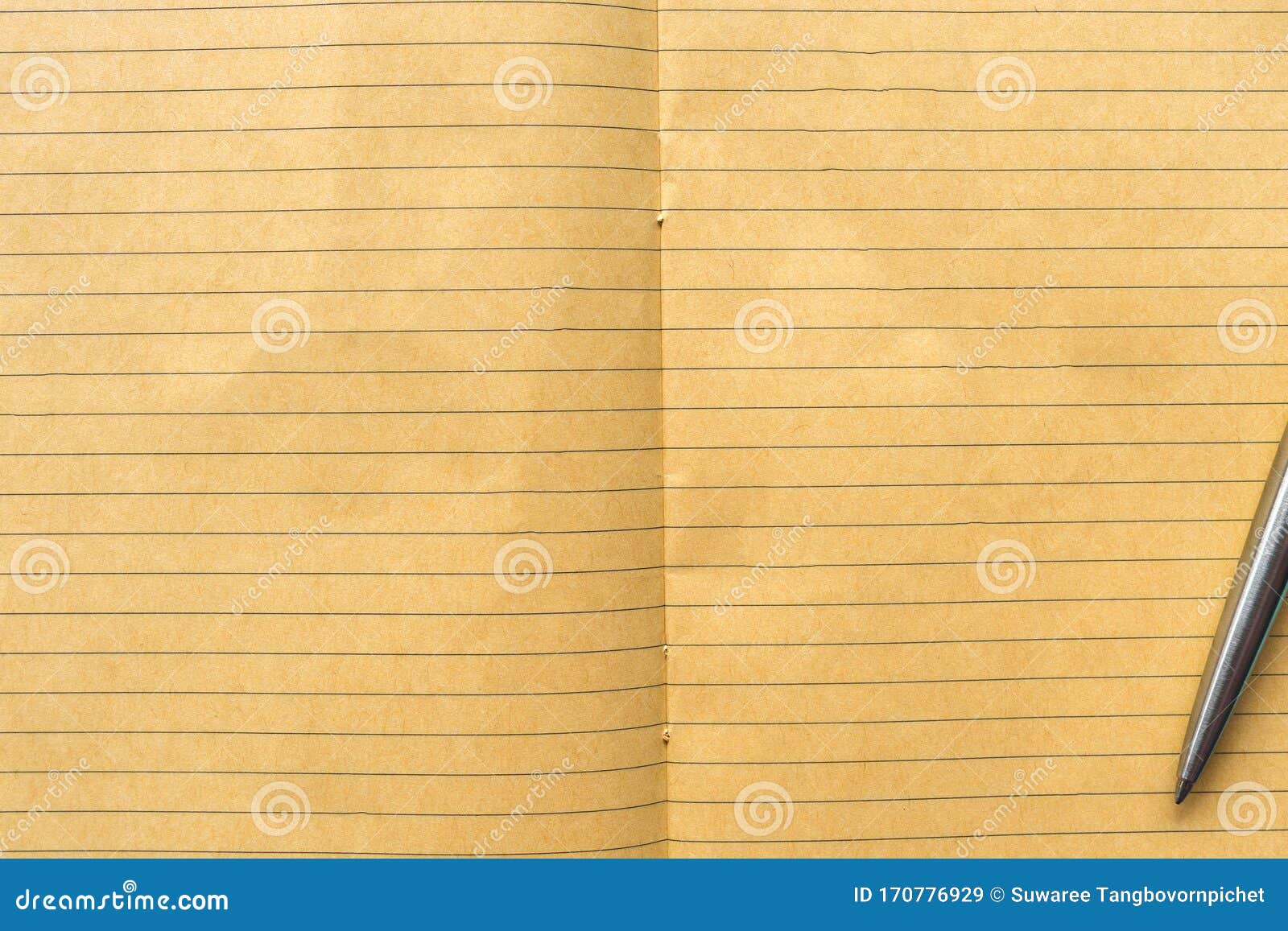 Top View Closed Up of Yellow Notebook with Line Texture and Pen Stock ...