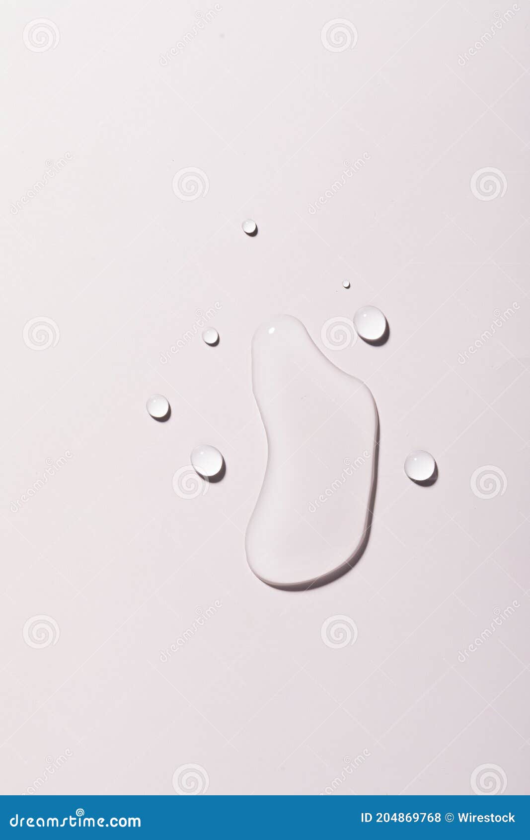 Top View Closeup of Multiple Water Drops on a Light Purple Background ...