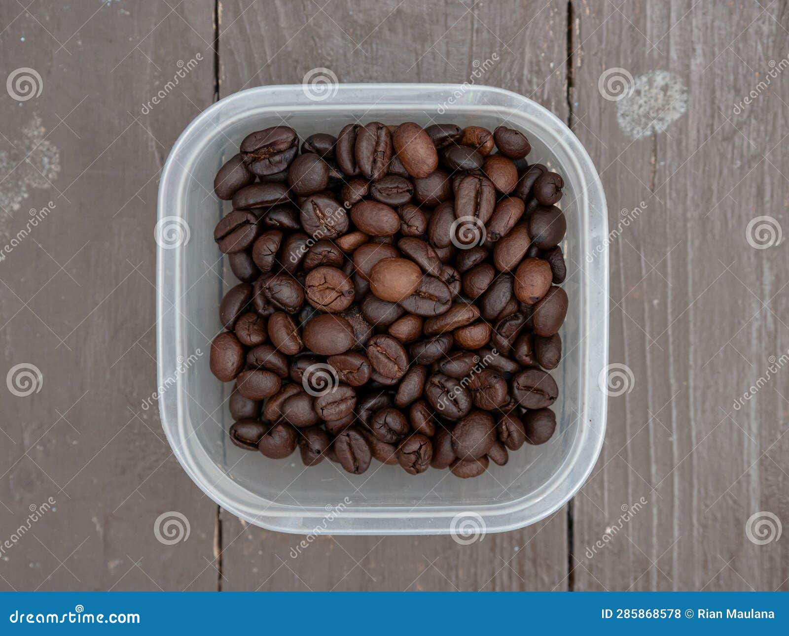 Top View of Coffee Beans in Transparent Plastic Container Stock Photo ...