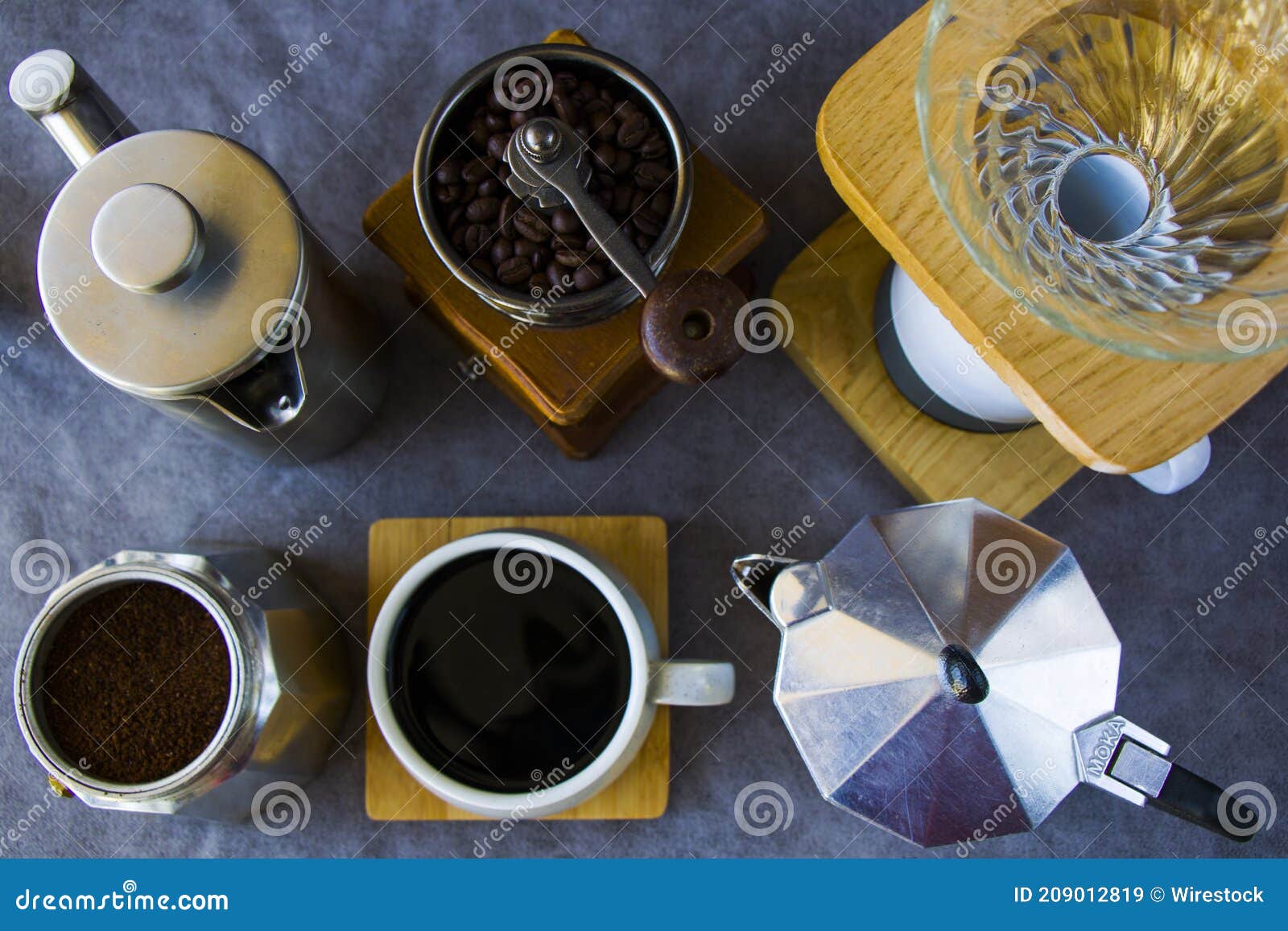 Top View of Coffee Makers, Grinder, and a Cup of Coffee on a Gray ...