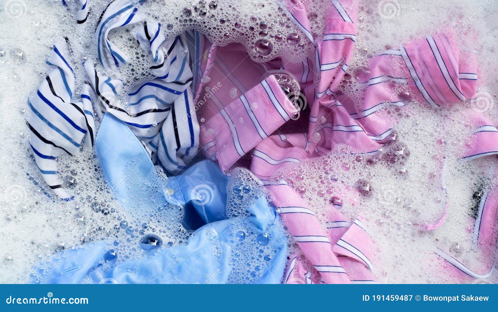 Color Clothes Soak in Powder Detergent Water Dissolution. Laundry ...