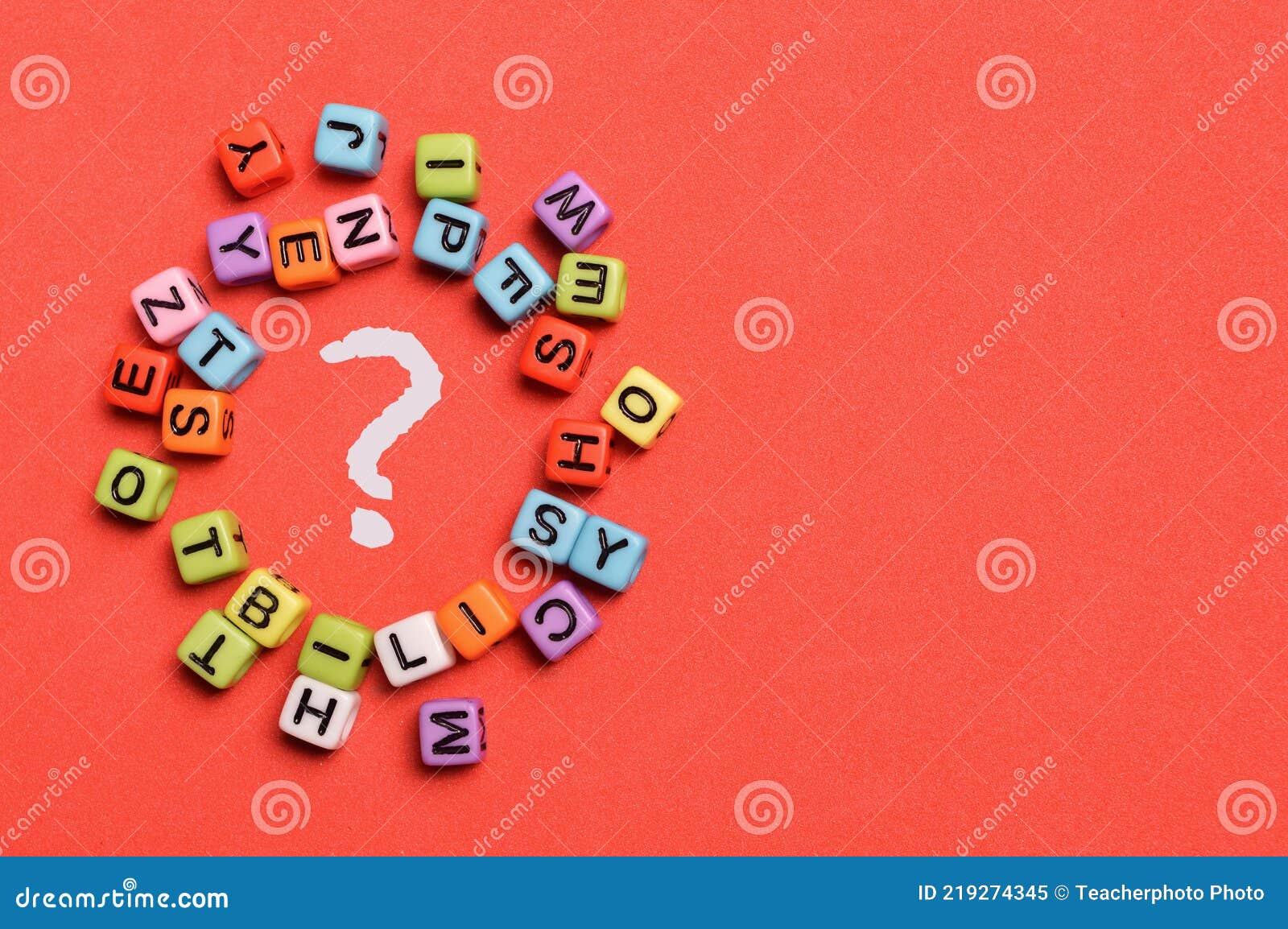 Top View of Colorful Alphabet Beads with Question Mark Drawn on Red ...
