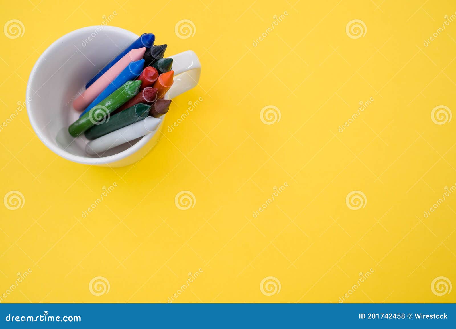 Top View of the Colorful Crayons in the Cup on the Yellow Surface ...