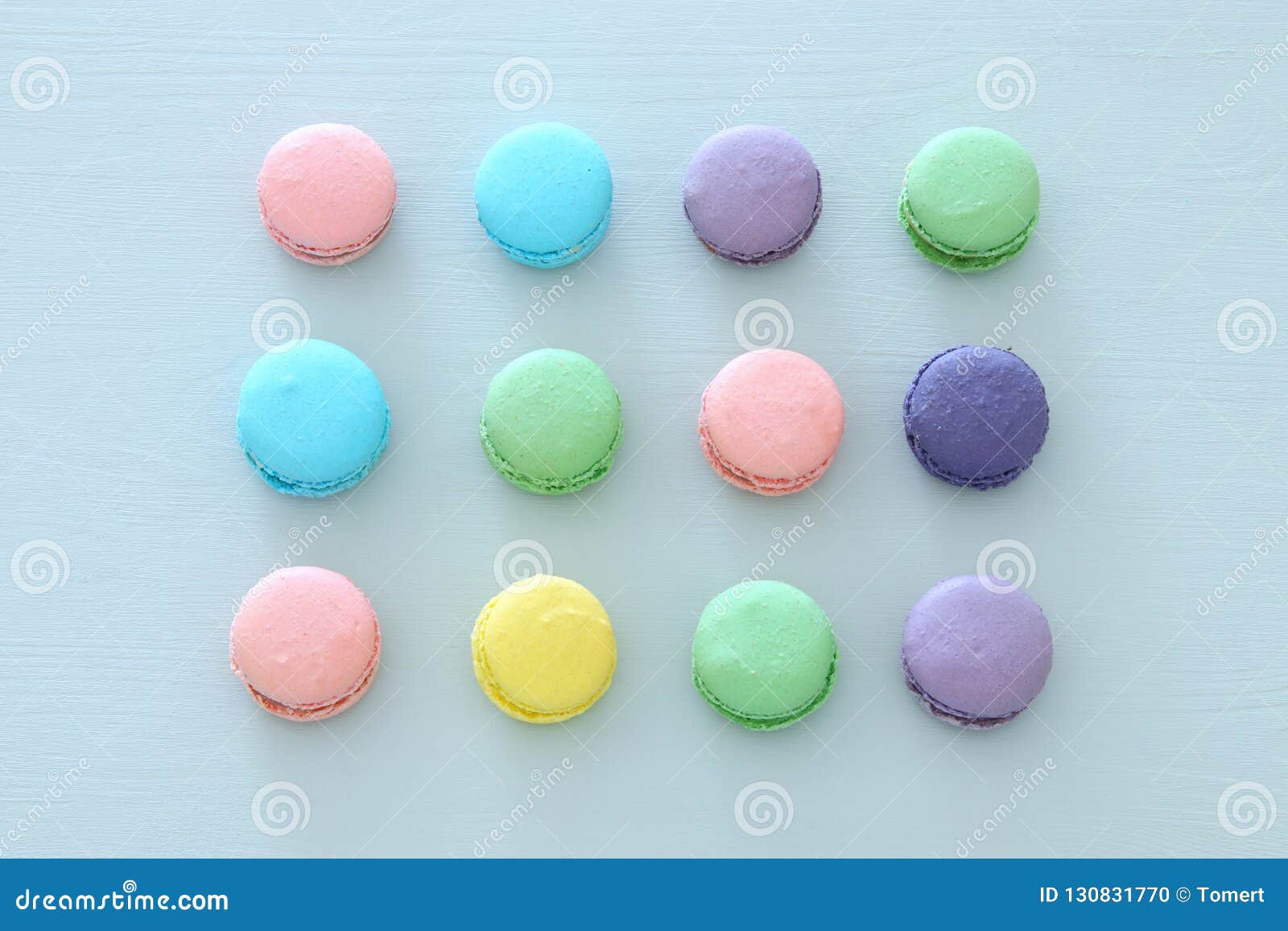 Top View of Colorful Macaron or Macaroon Over Pastel Blue Background ...