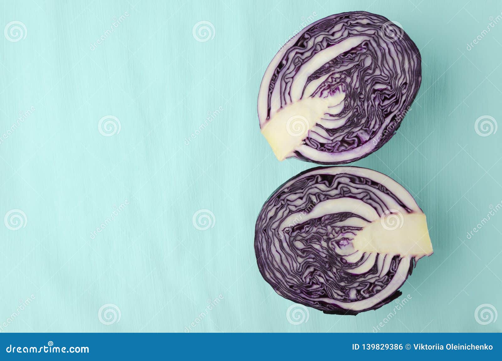 Close Up of Head of Red Cabbage Cut in Half on Blue Bright Surface ...