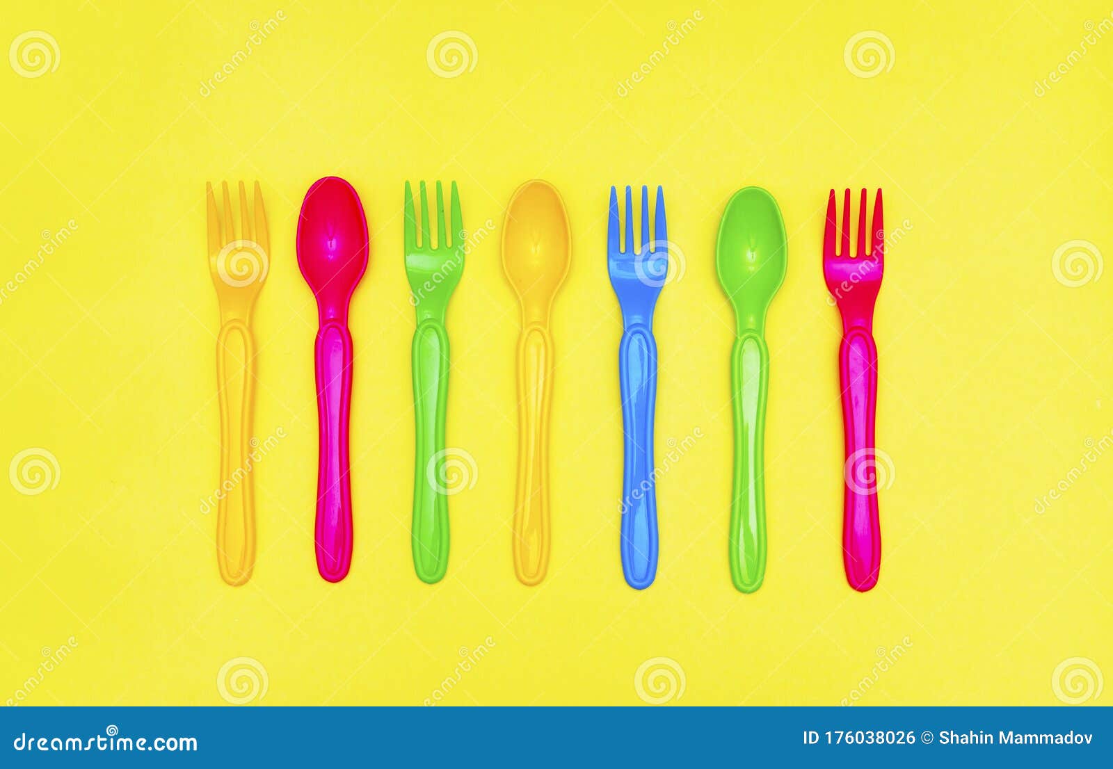 Top View of Colorful Spoon and Fork Element on Yellow Color Table.flat ...