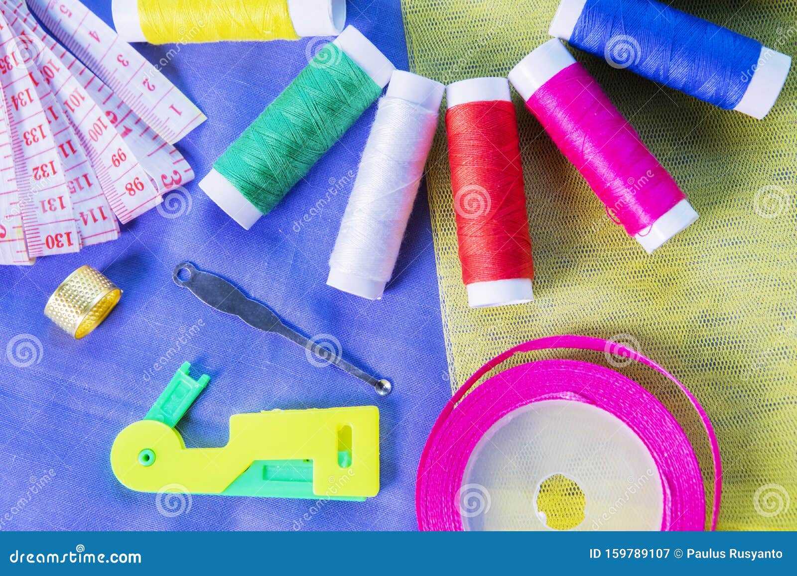 Colorful Threads with Sewing Tools Over Silk Fabric Stock Image - Image ...