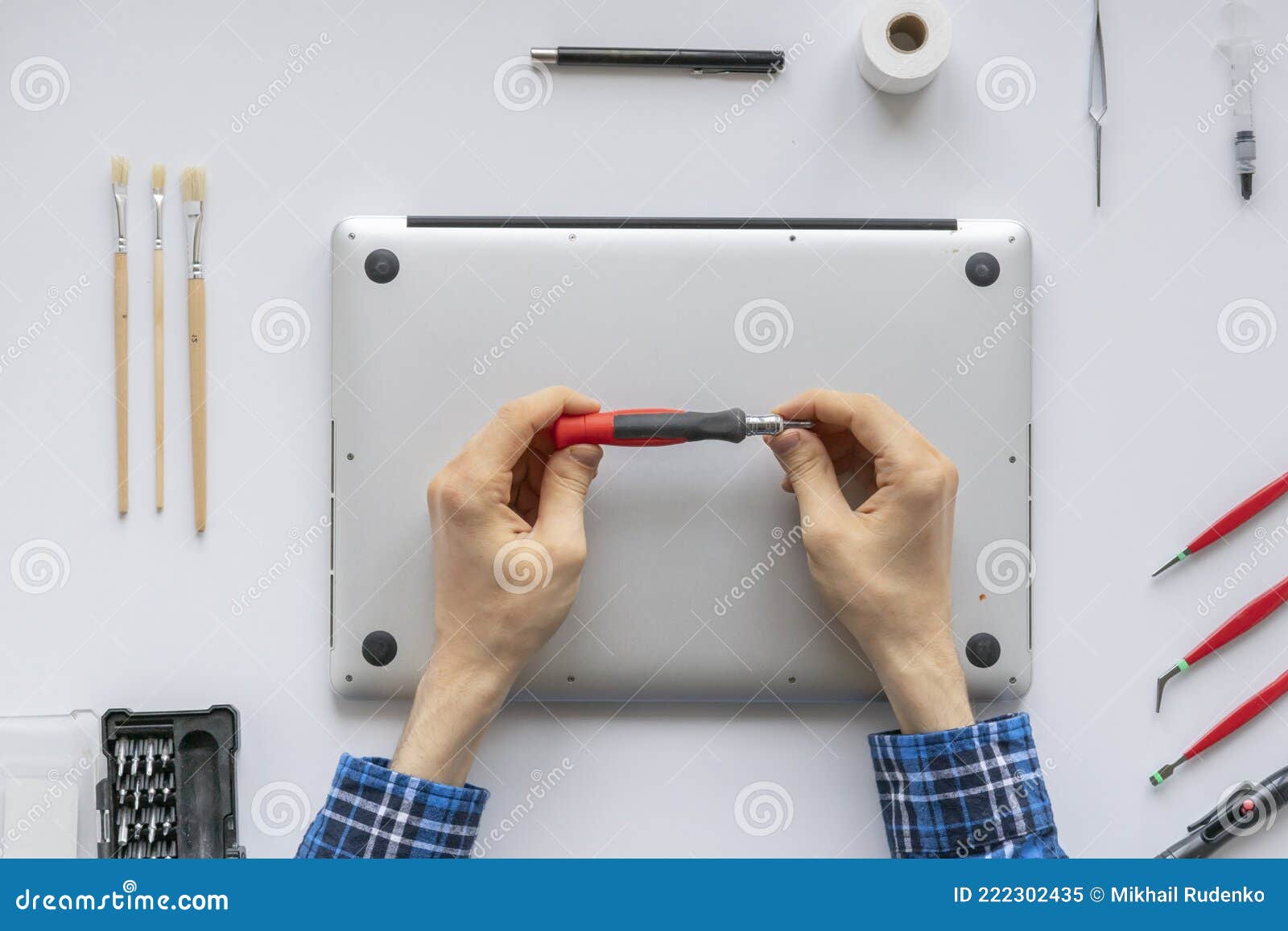 A Top View of the Computer Master in the Service Fixing the Laptop ...