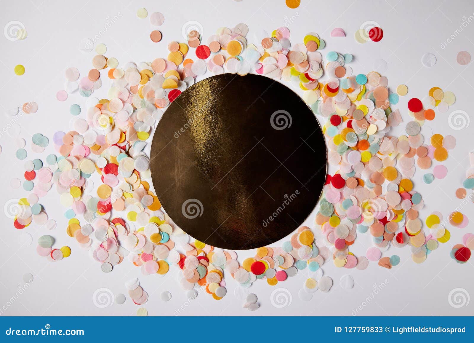 Top View of Confetti Pieces Around Black Circle on White Surface Stock ...