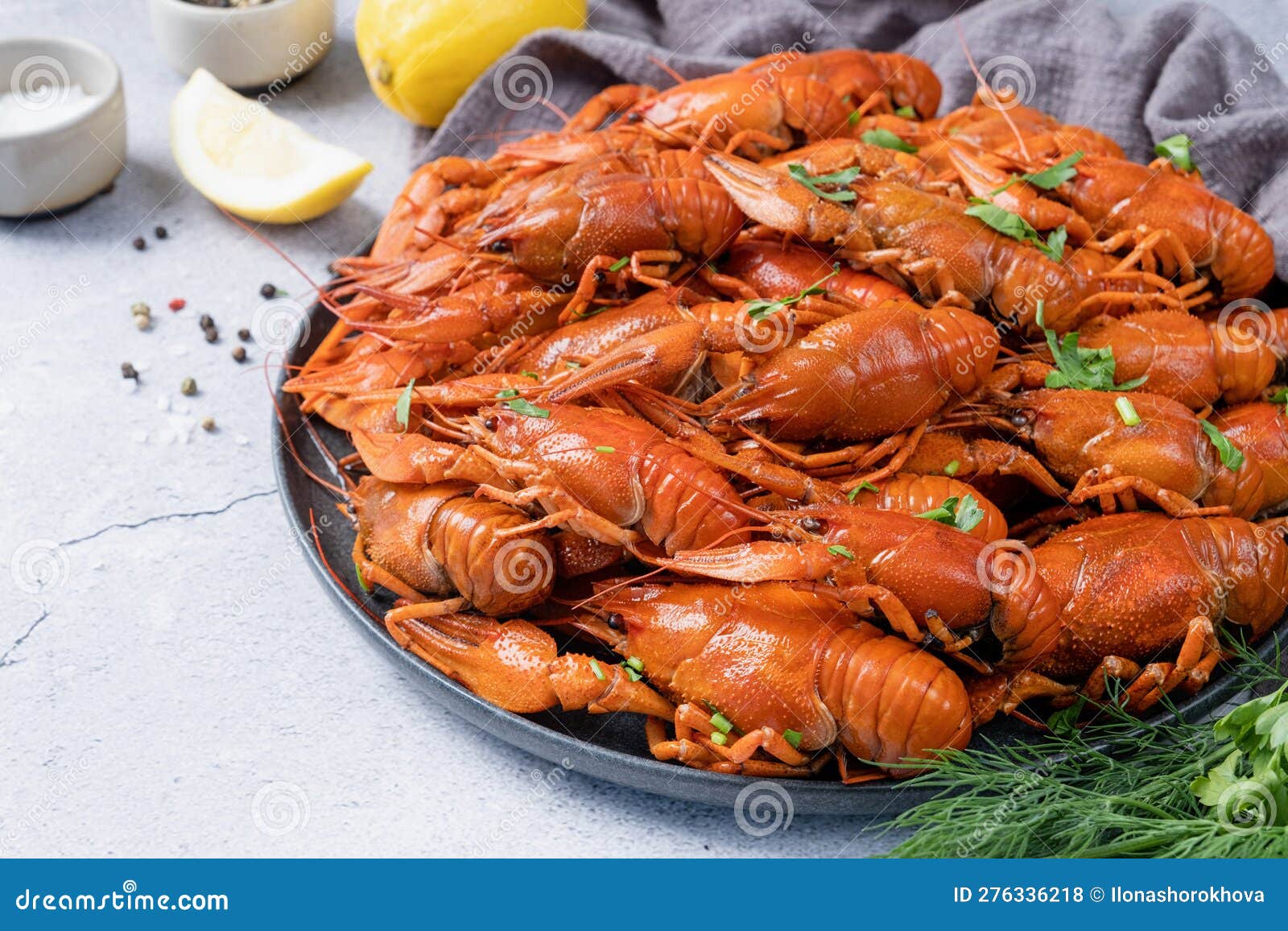 Top View of Cooked Crawfish Platter with Lemons and Spices on Cement ...