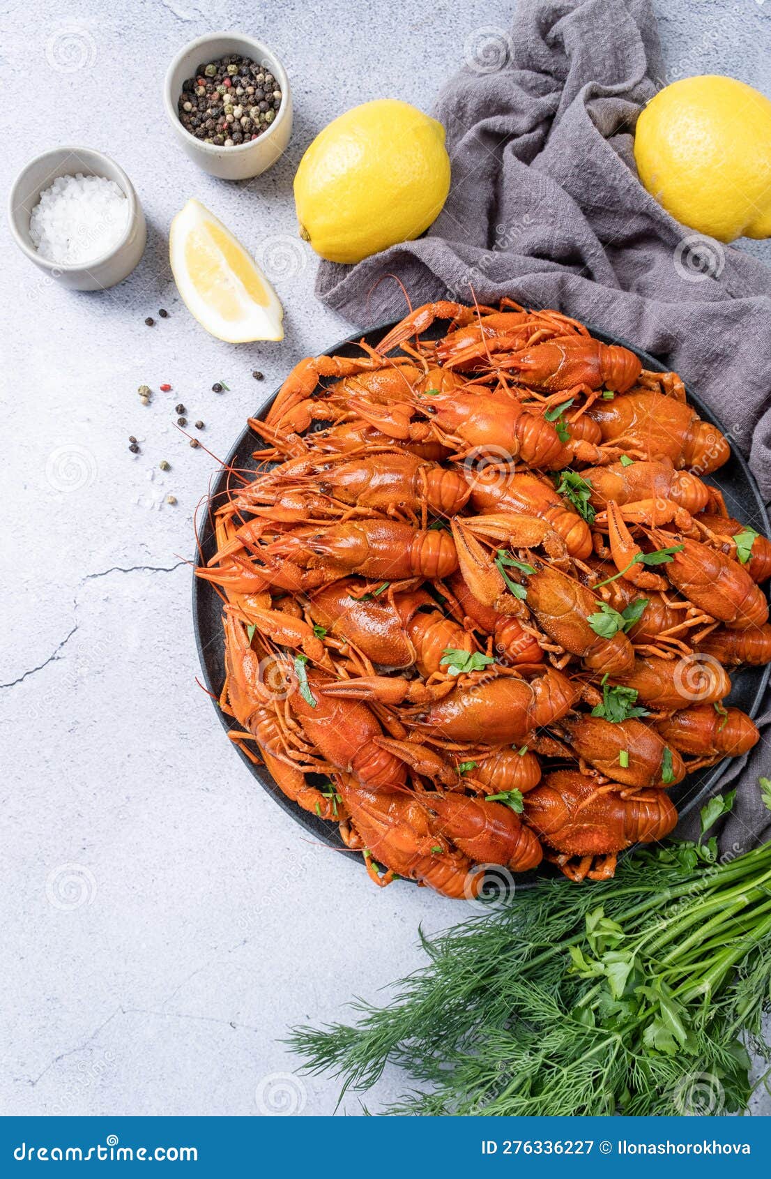 Top View of Cooked Crawfish Platter with Lemons and Spices on Cement ...