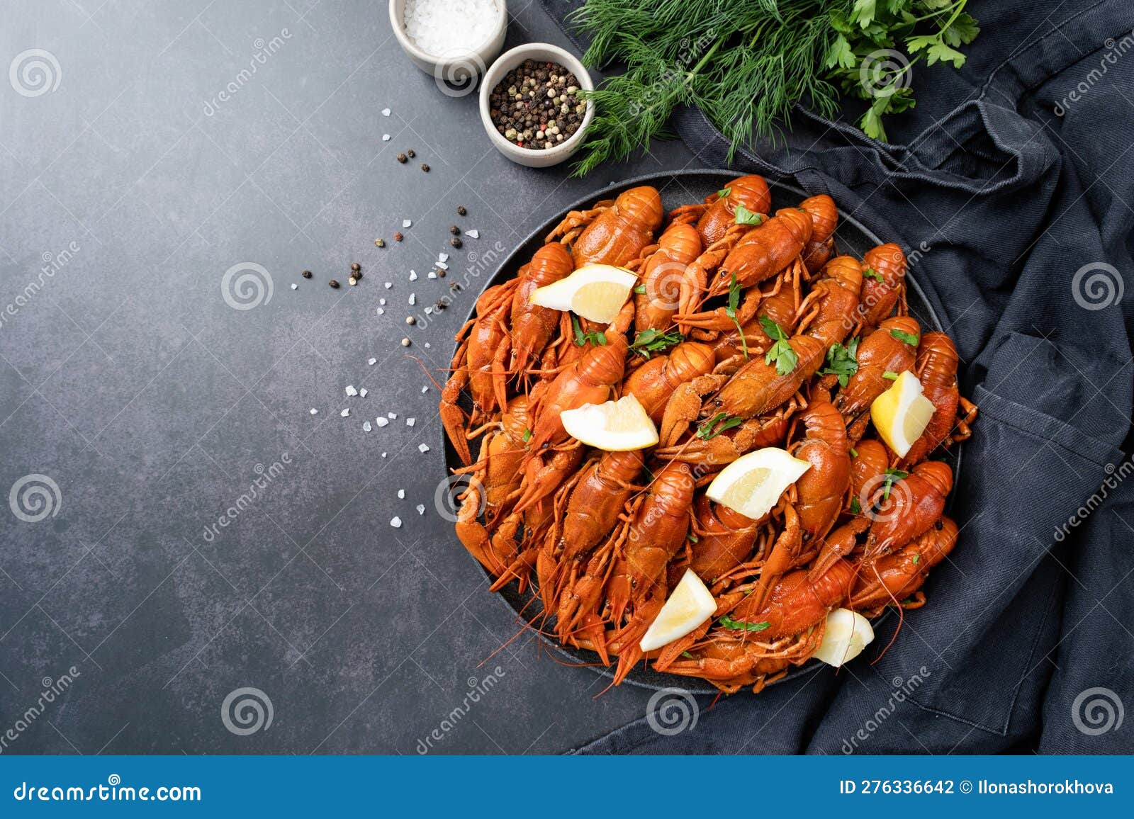 Top View of Cooked Crawfish Platter with Lemons and Spices on Cement ...