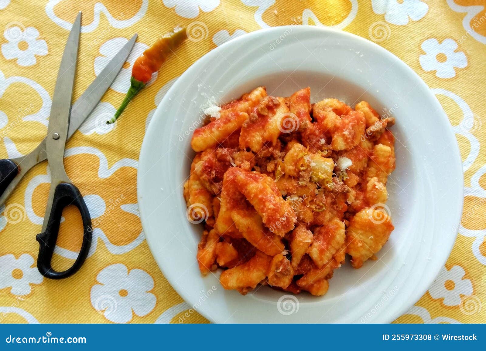 Top View of Cooked Malloreddus Pasta Served on the Table with Scissors ...