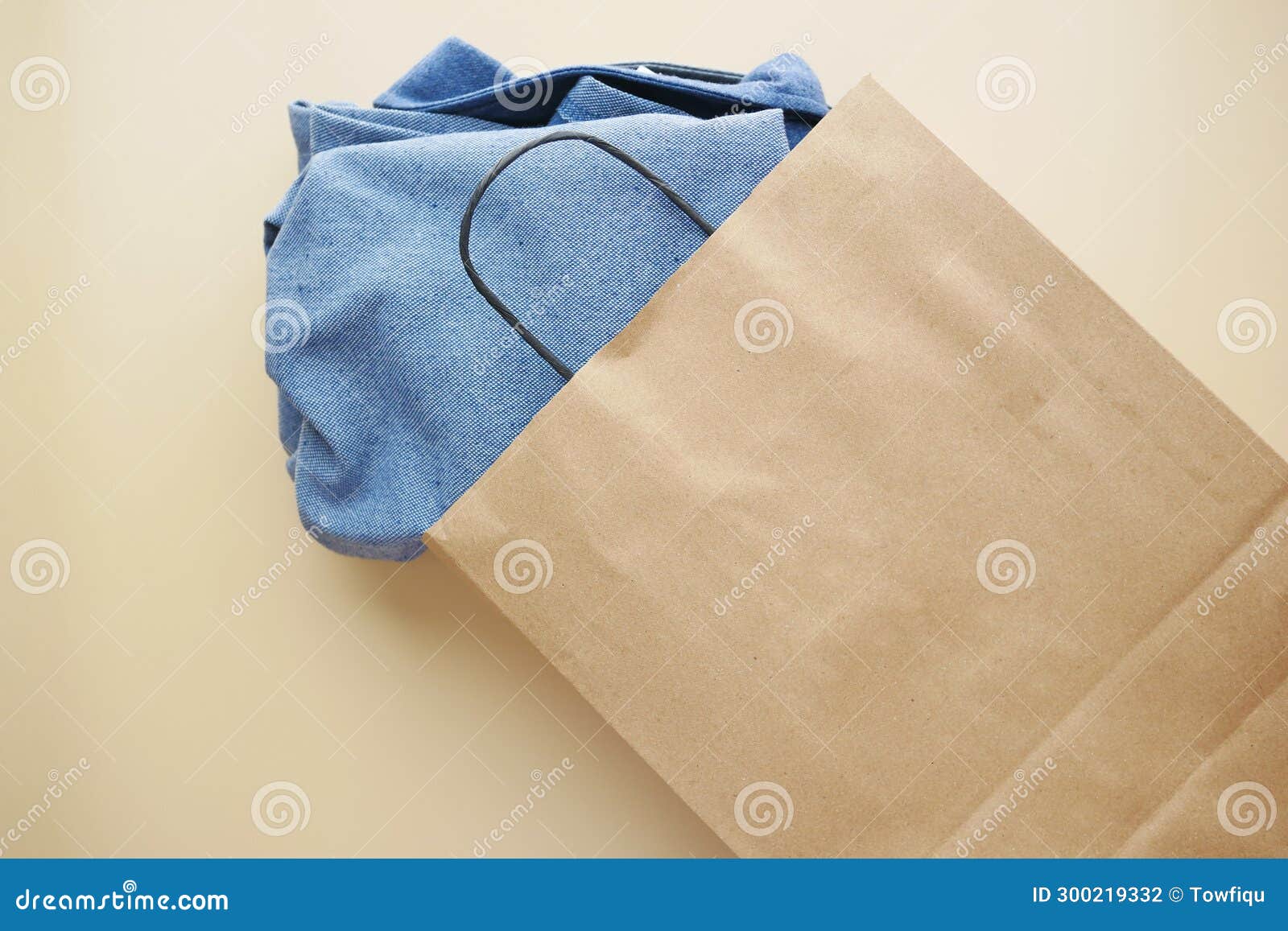 Top View of Craft Paper Bag with Shirt , Stock Photo - Image of shopper ...