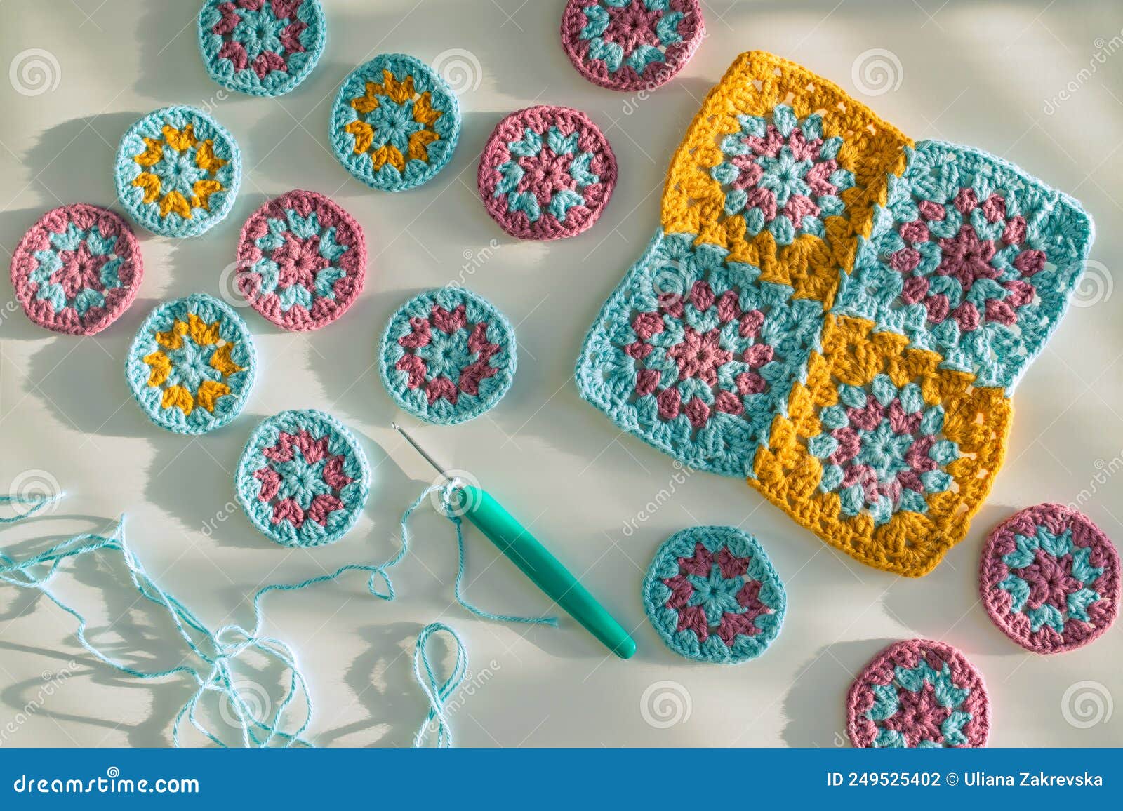 Top View of Crochet Motifs and a Hook with Crochet Chain Started, on ...