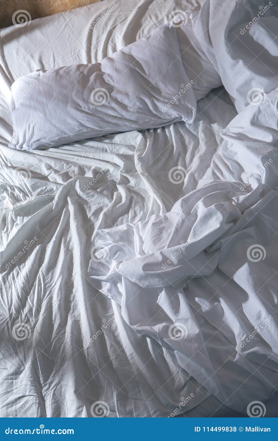 Top view of a crumpled bed stock photo. Image of crease - 114499838