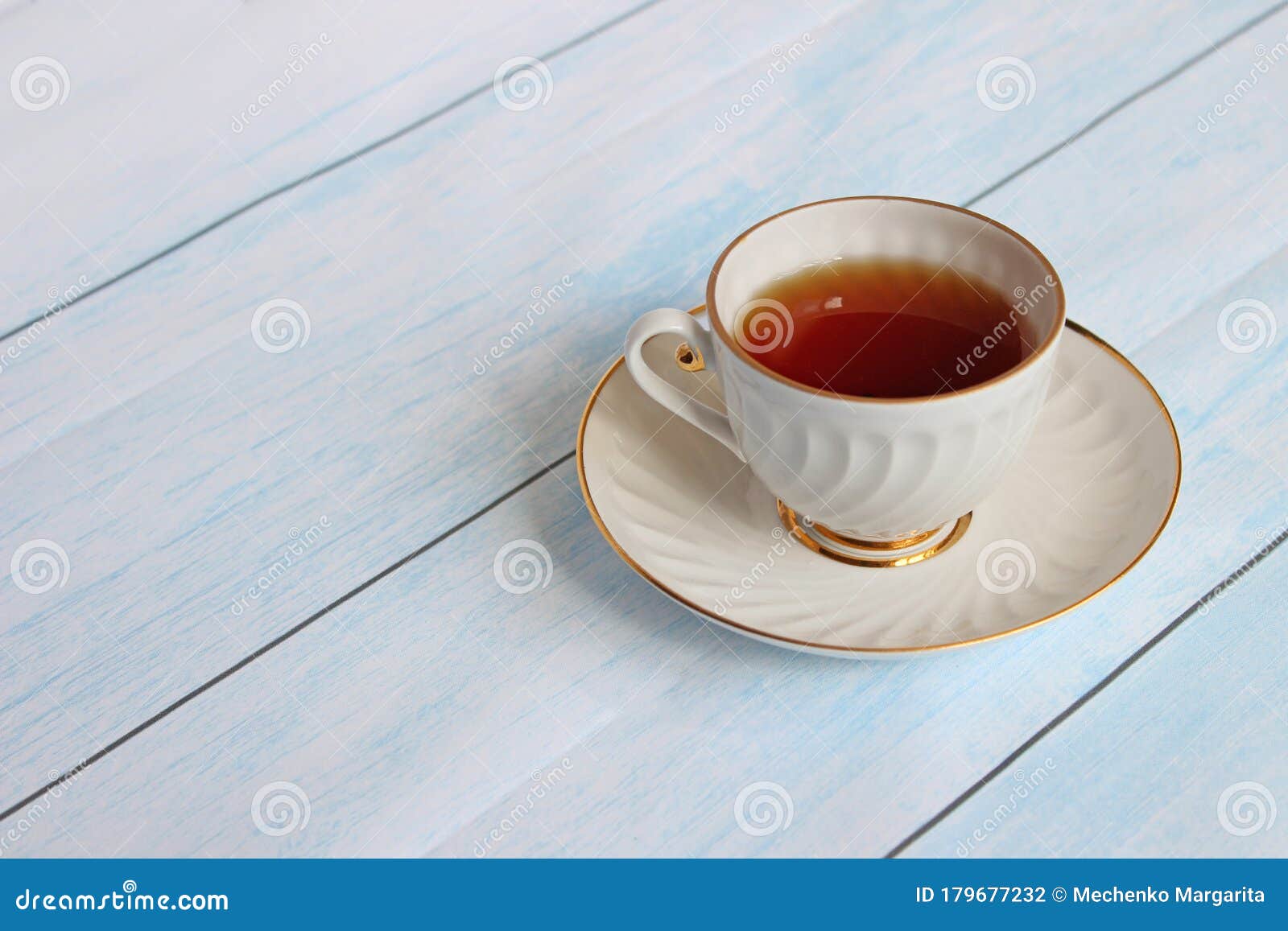 Top View of a Cup of Tea with Tea Bag on Blue Wooden Table Stock Photo ...