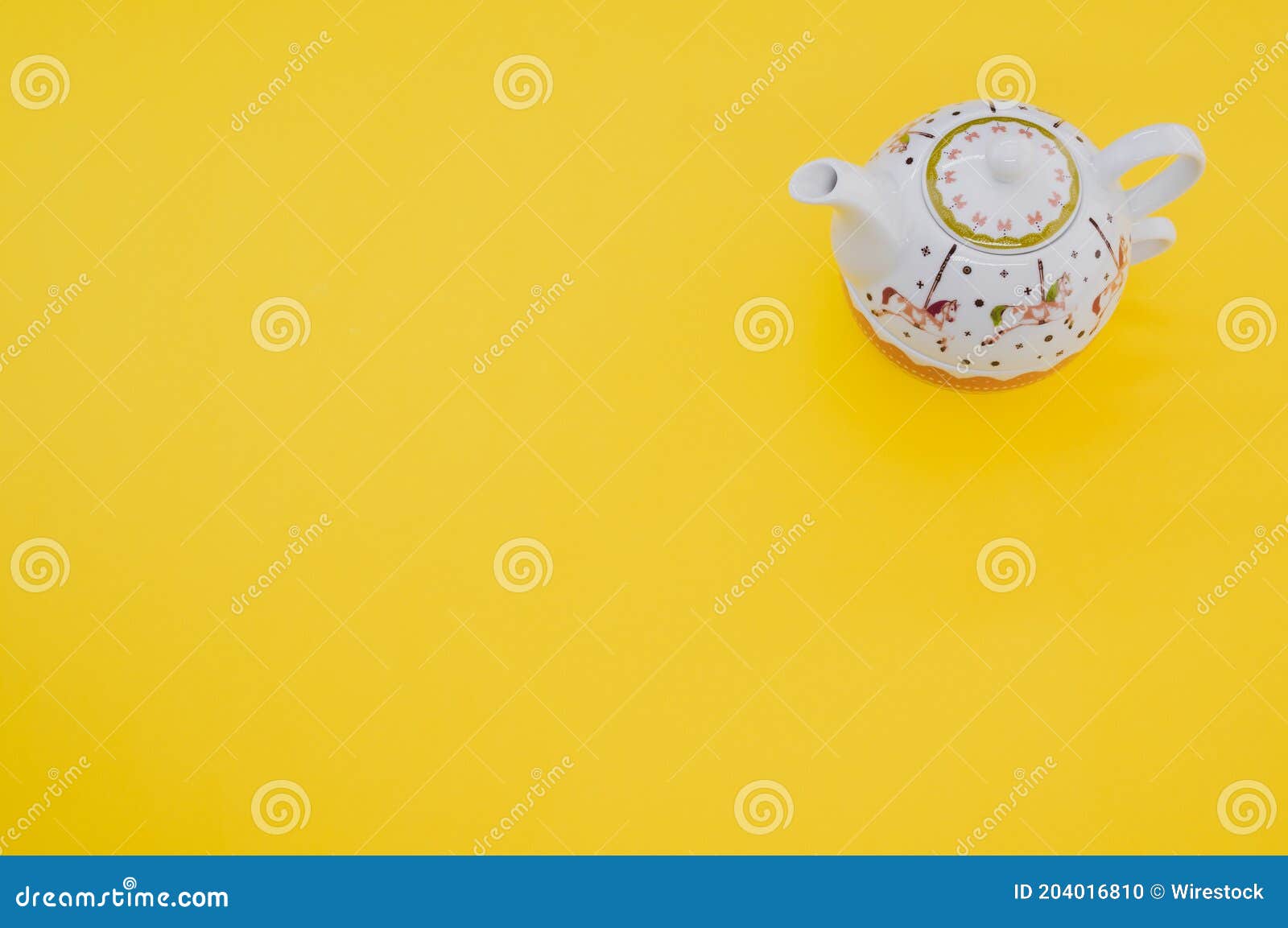 Top View of Decorative Teapot Isolated on Yellow Background Stock Photo ...