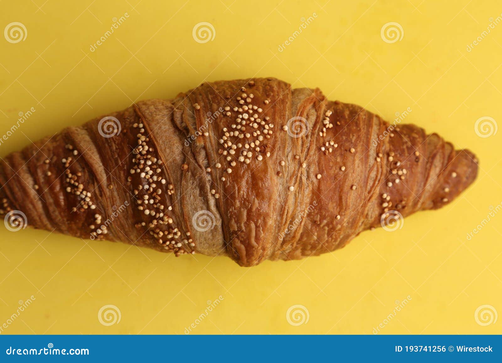Top View of a Delicious Croissant on a Yellow Background Stock Photo ...