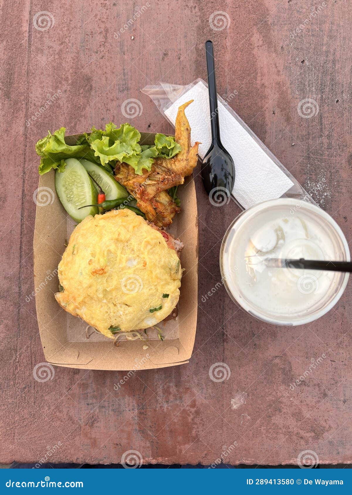 Top View of Delicious Fried Rice with Egg on Top and Fried Chicken ...