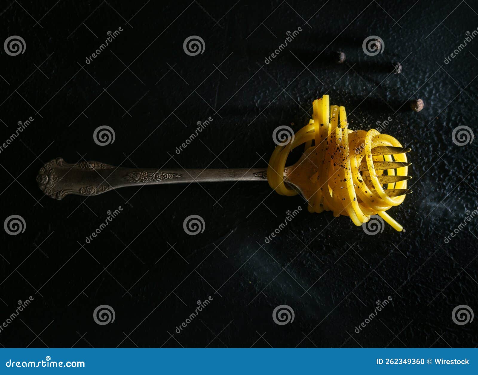 View of a Delicious and Hot Spaghetti Pasta Wrapped Around a Fork on a ...