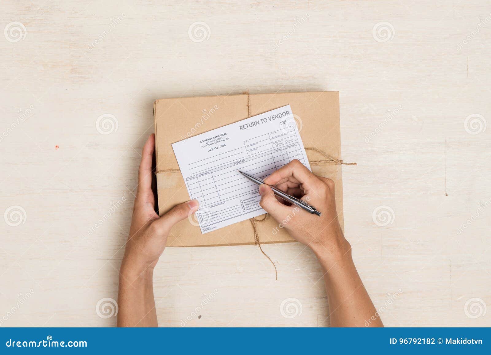 Top View of Deliveryman Making Notes in Stock Photo - Image of package ...