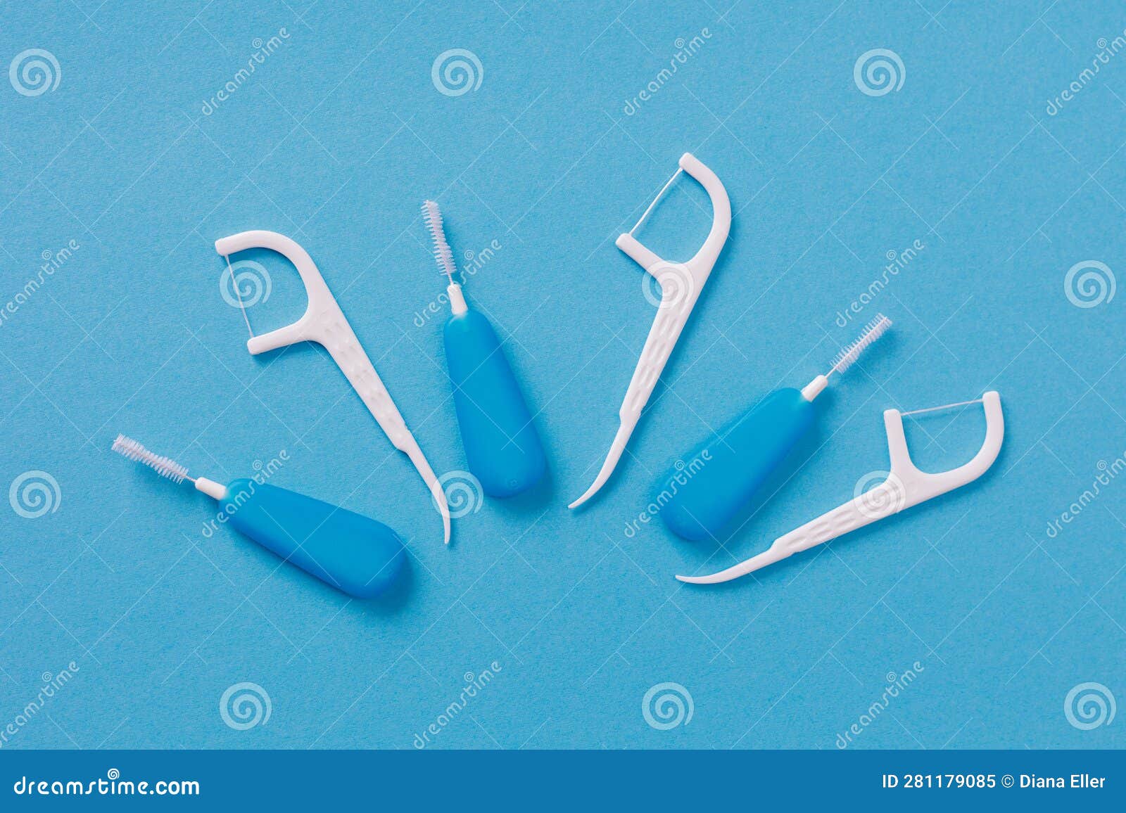 Top View of Dental Floss Picks on Blue Background Stock Image - Image ...